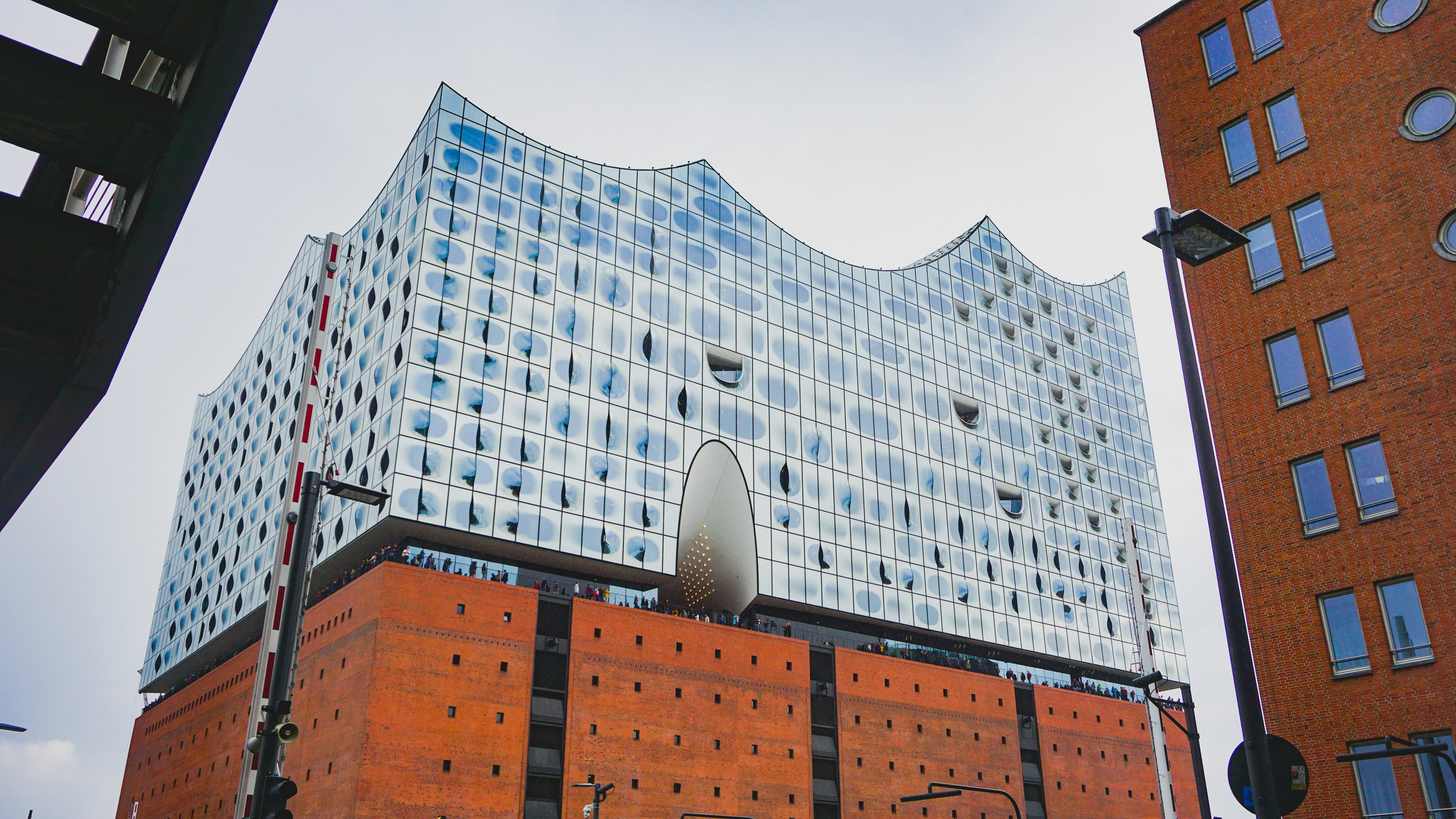 Modern glass building with brick base