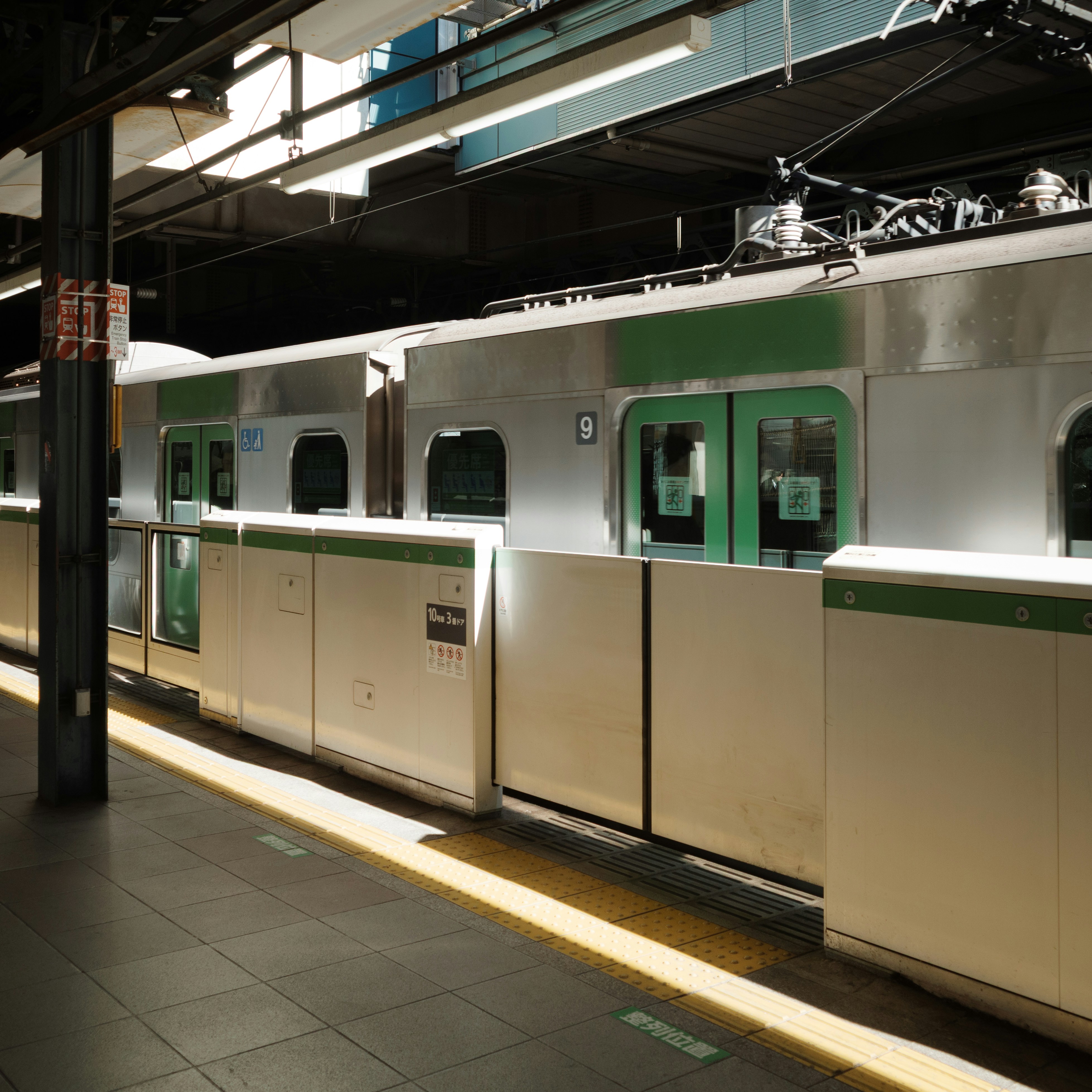 A modern train at a station platform.