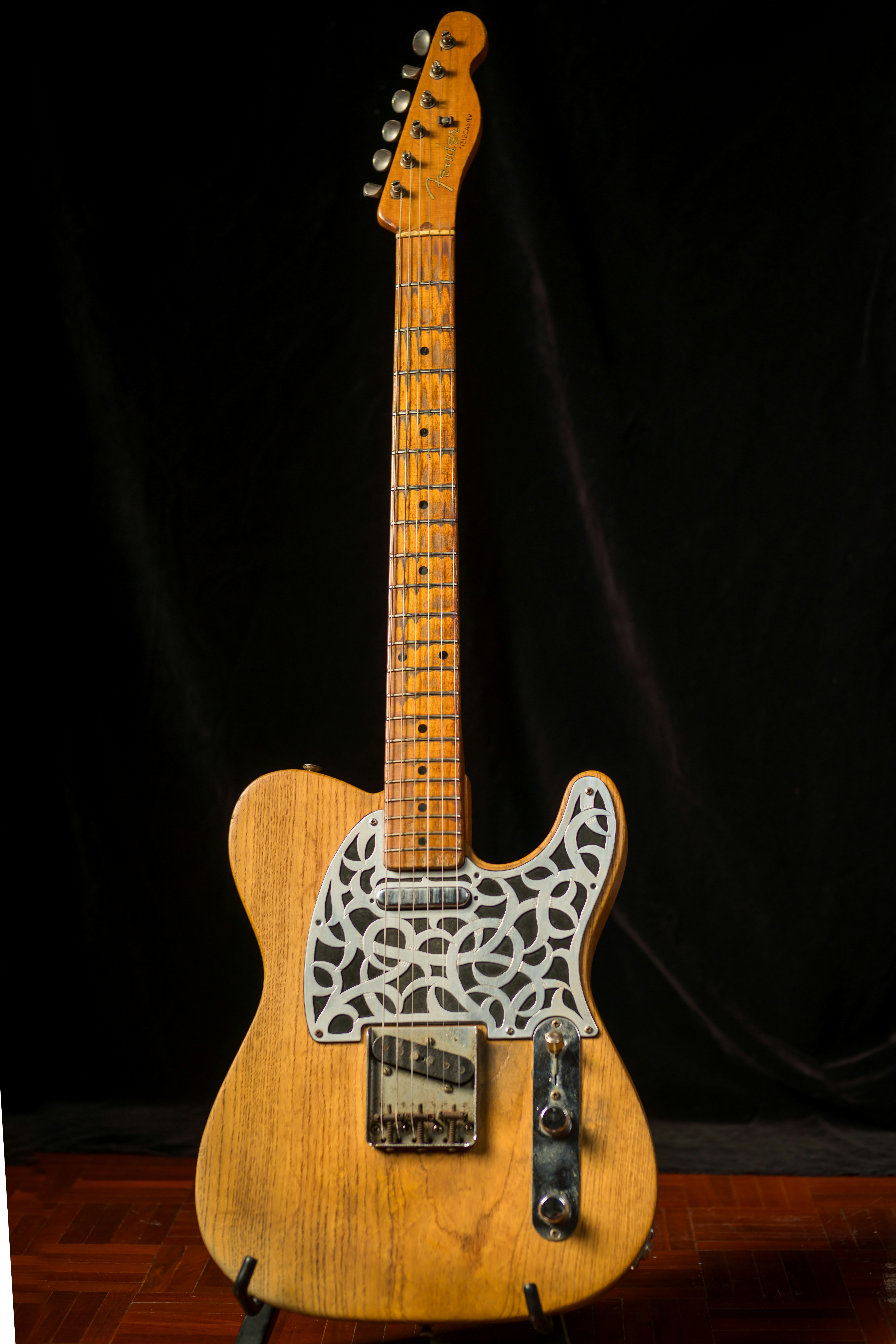 1956 Telecaster | A vintage electric guitar with a decorative pickguard.
