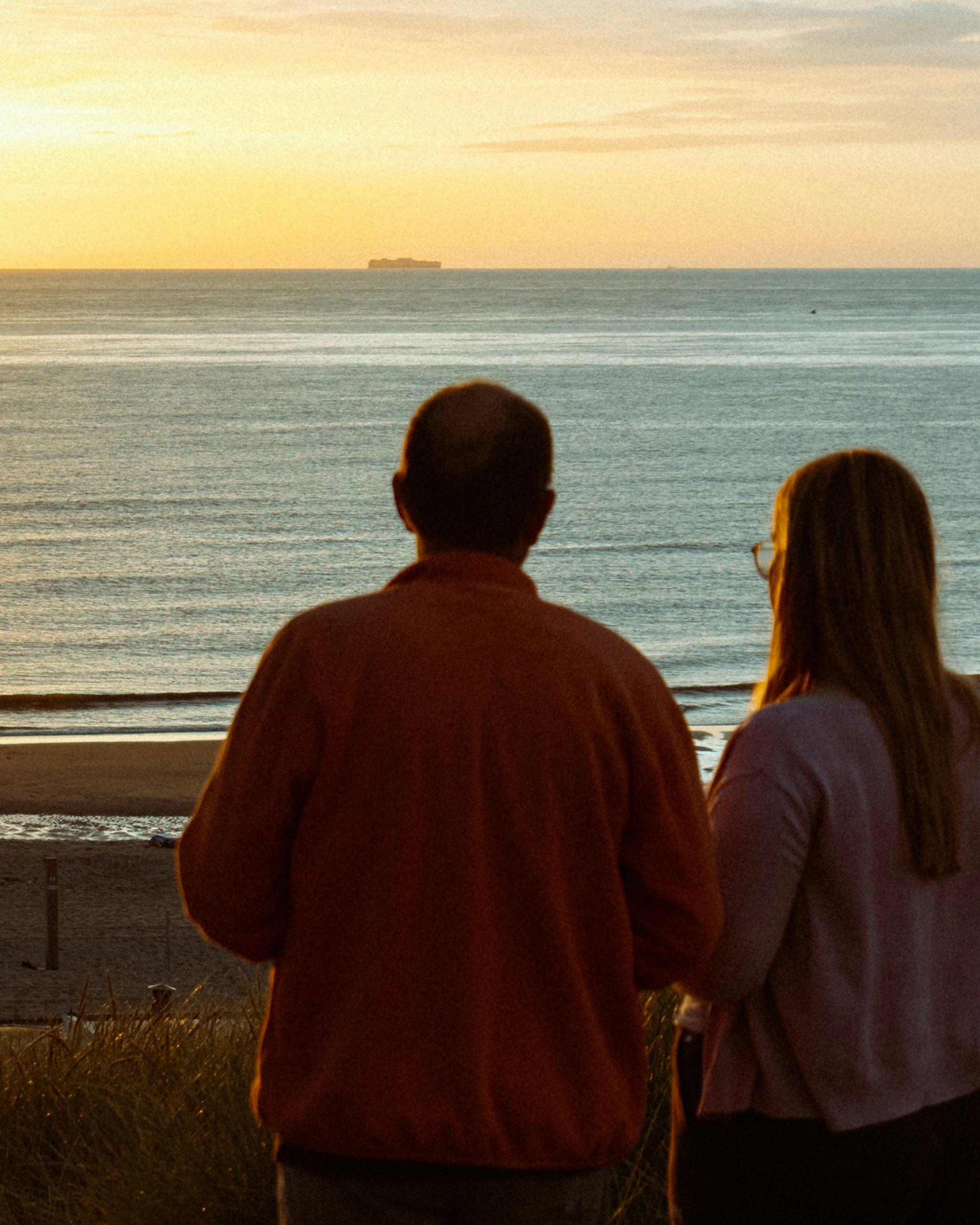 Embracing the Horizon: A Moment at Dusk