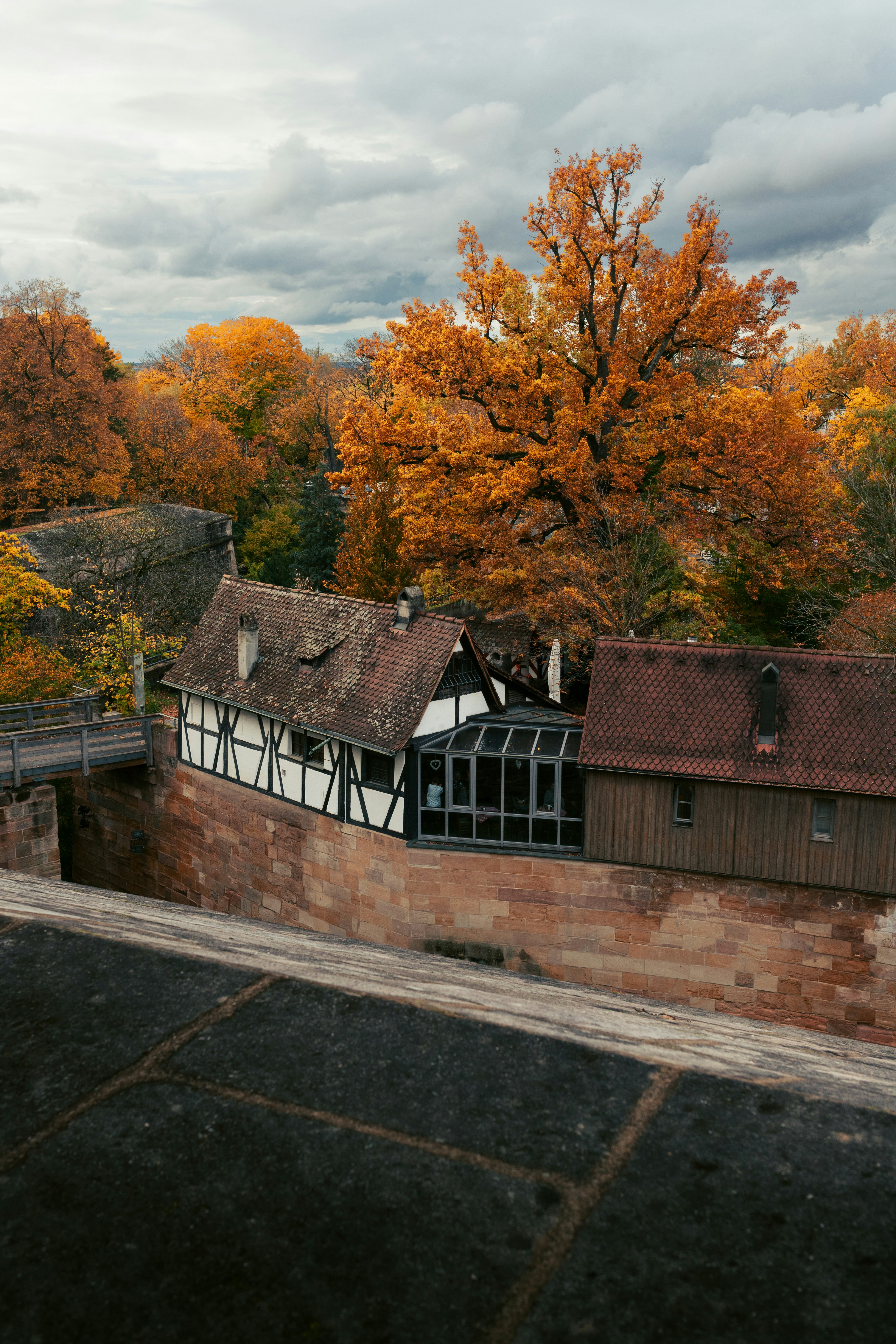 Autumn's Embrace Over Timeless Architecture