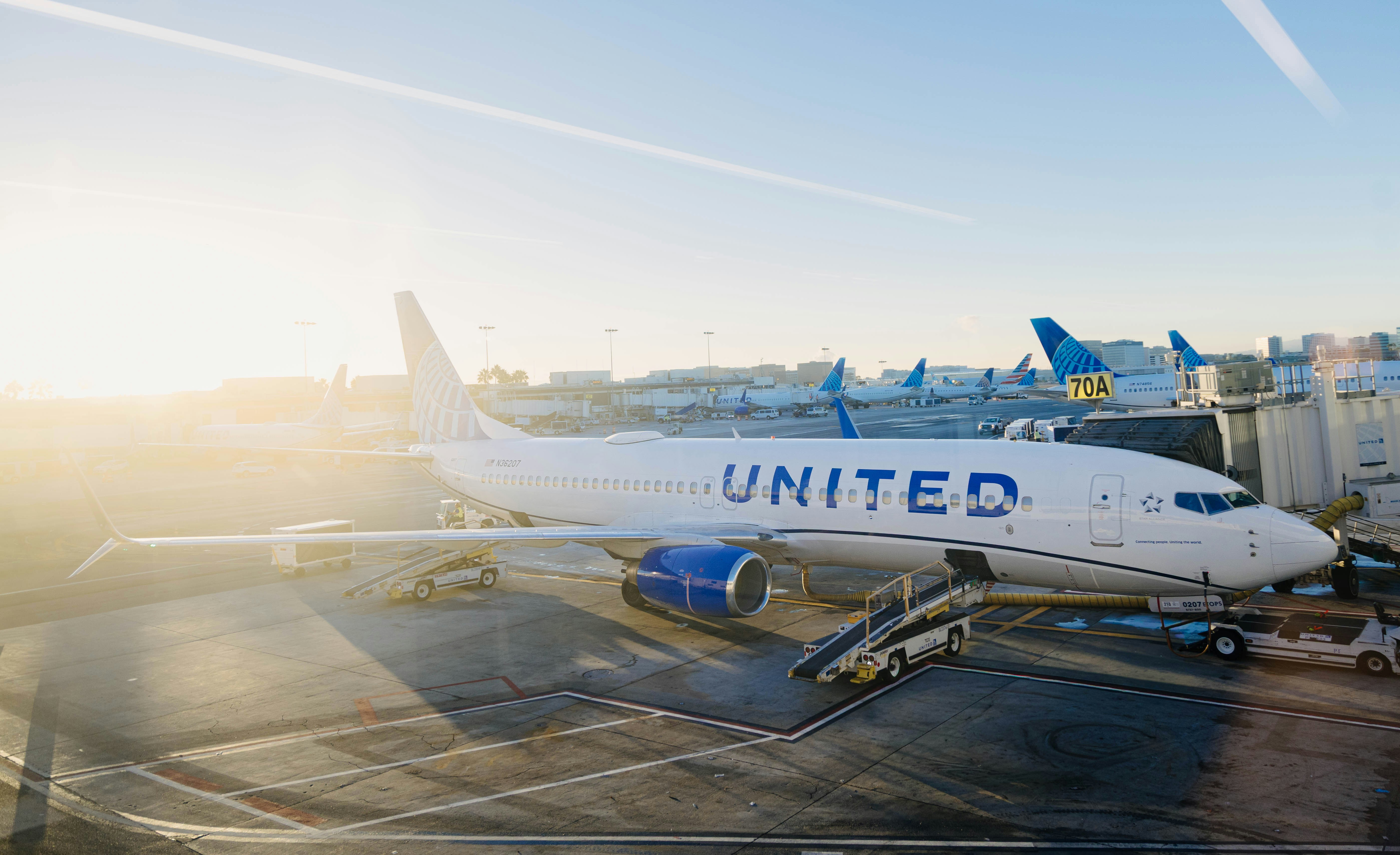 United airplane at the gate during sunrise