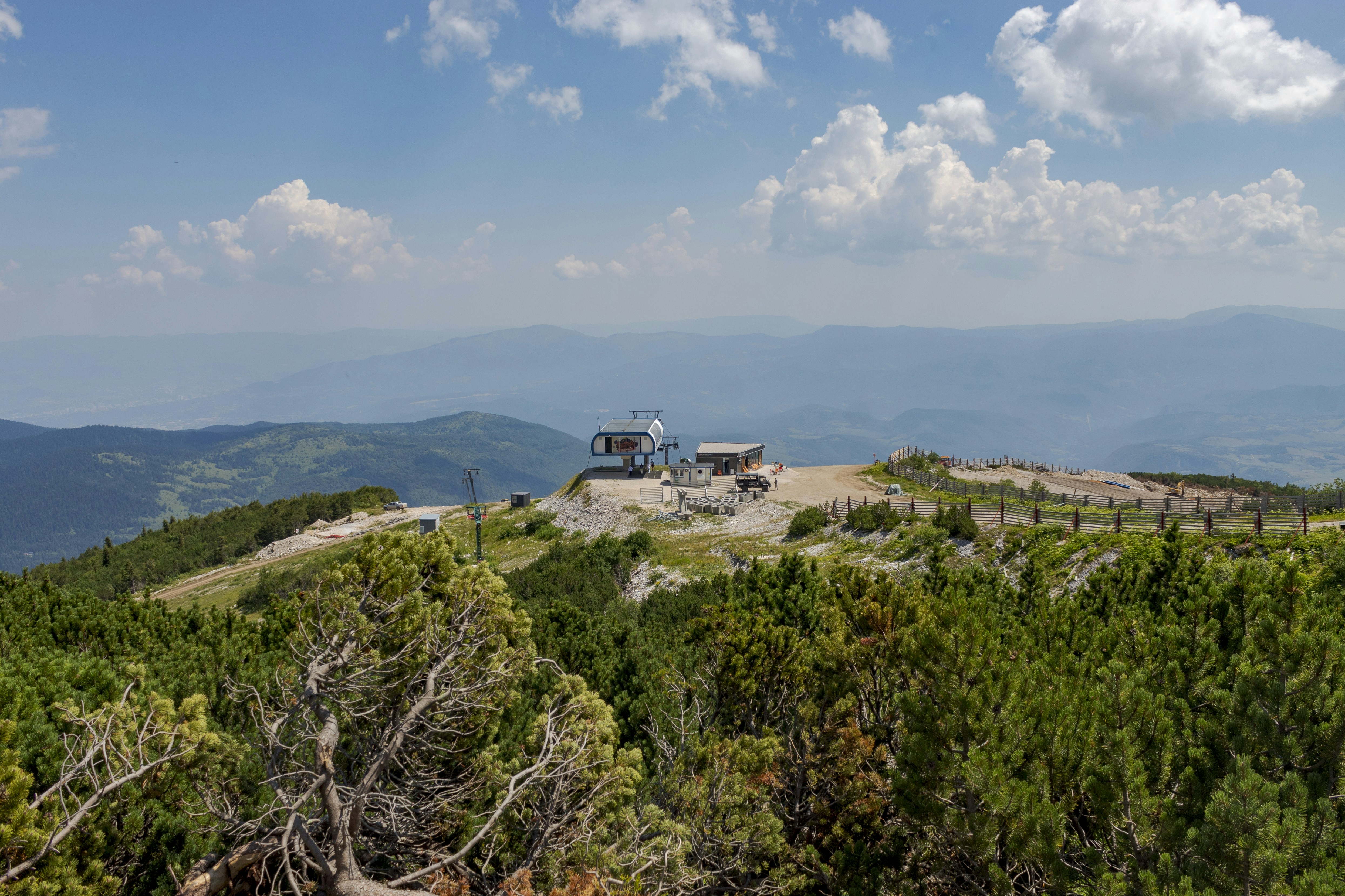 Nature IG => SporisevicPhotography | Mountain station with trees and distant hills