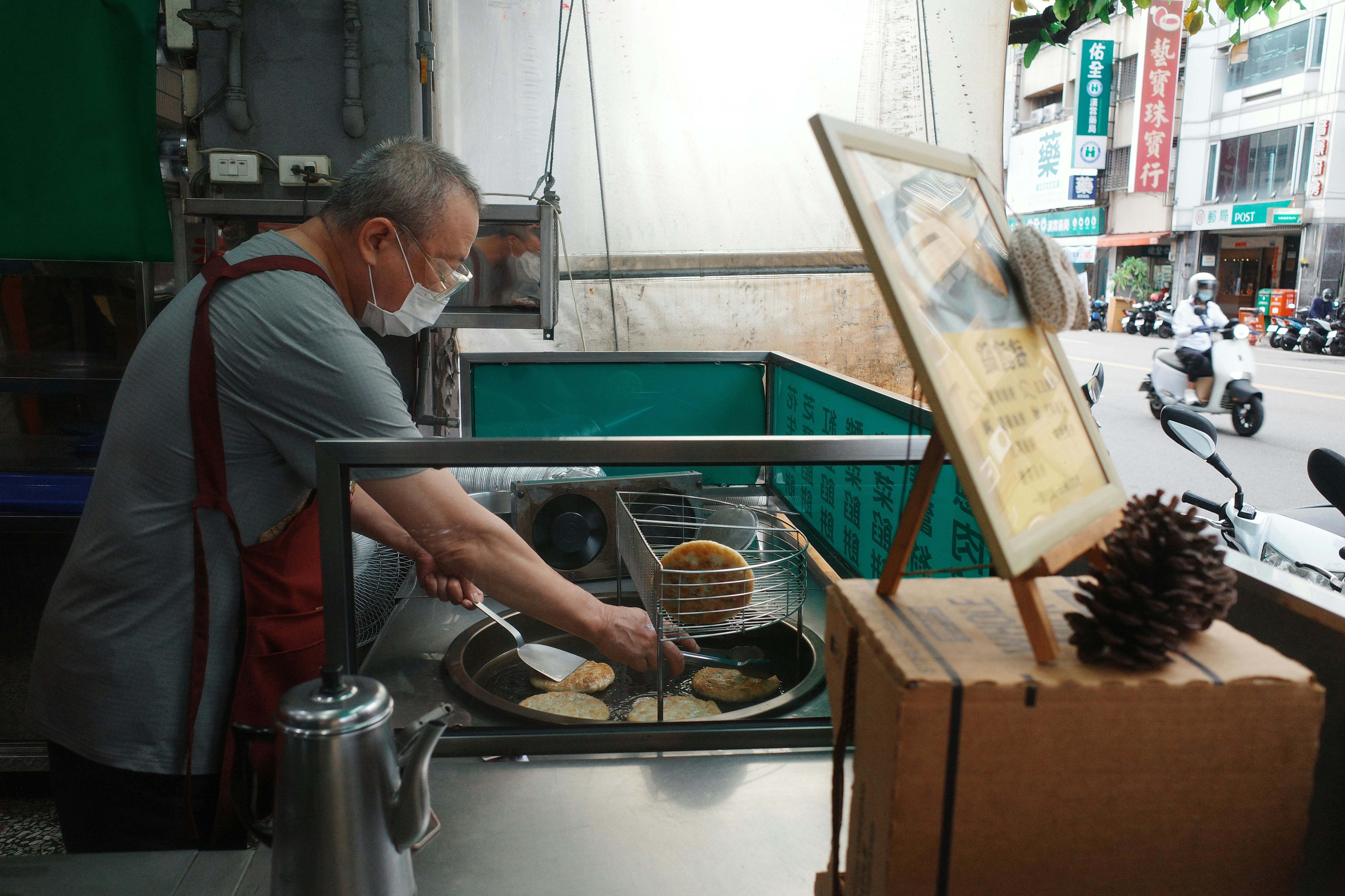 Frying Tradition: A Culinary Moment in Motion