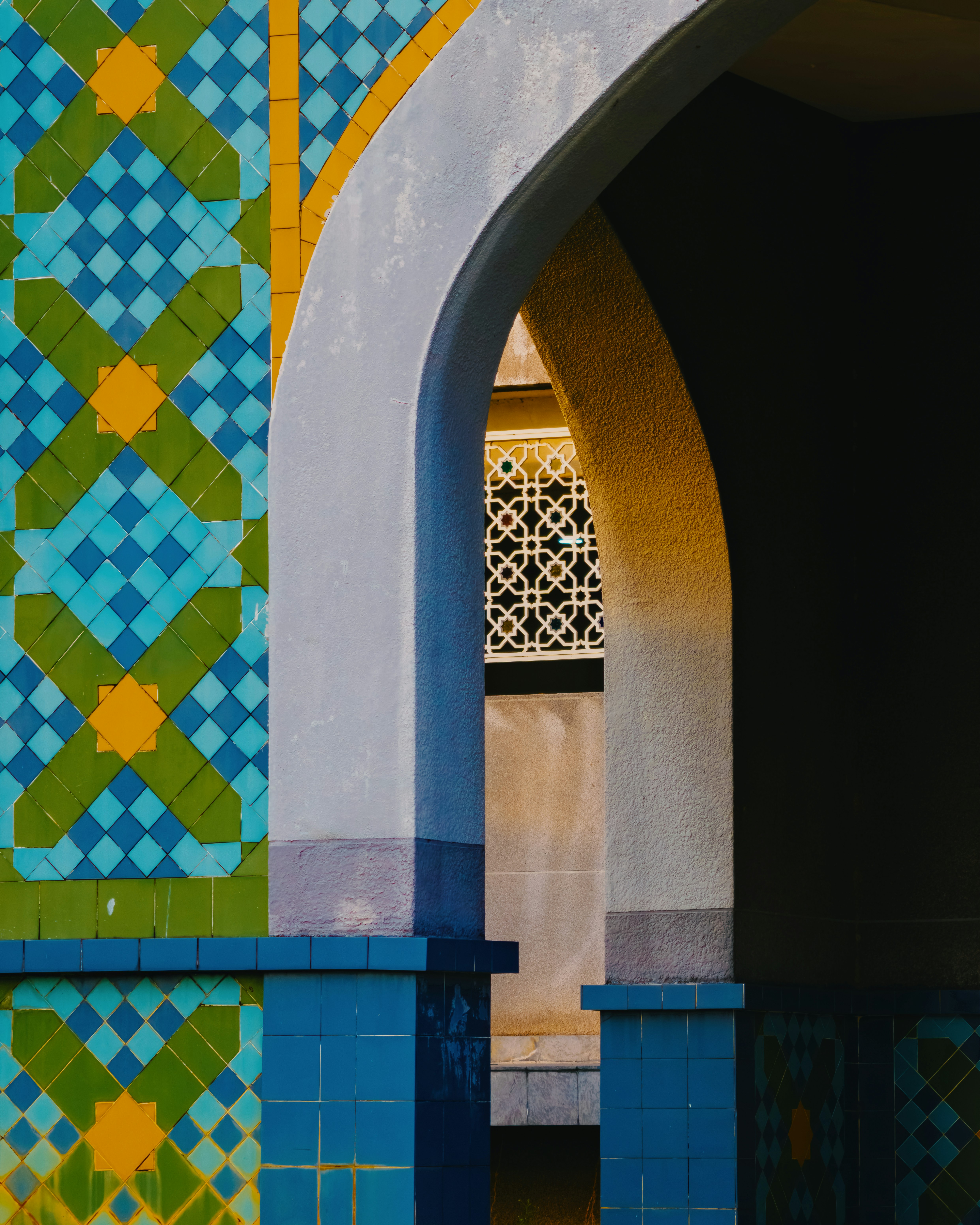 Masjid Sultan Abdul Samad. Shot on Oppo Find X8 Ultra. | Ornate architectural details with vibrant blue and yellow tiles.