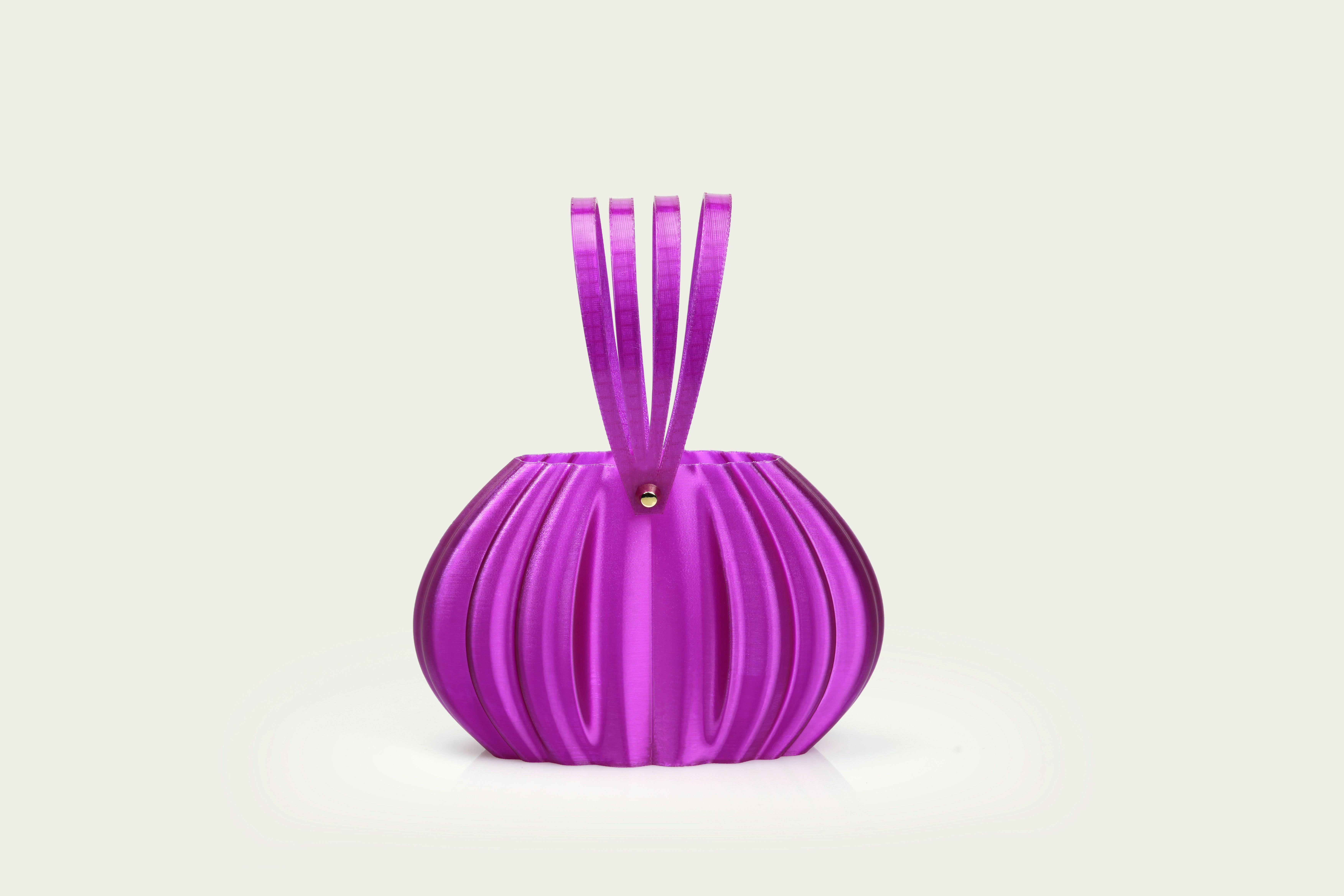 Stylish purple handbag featuring a unique ribbed texture and elongated handles, set against a minimalist background.
