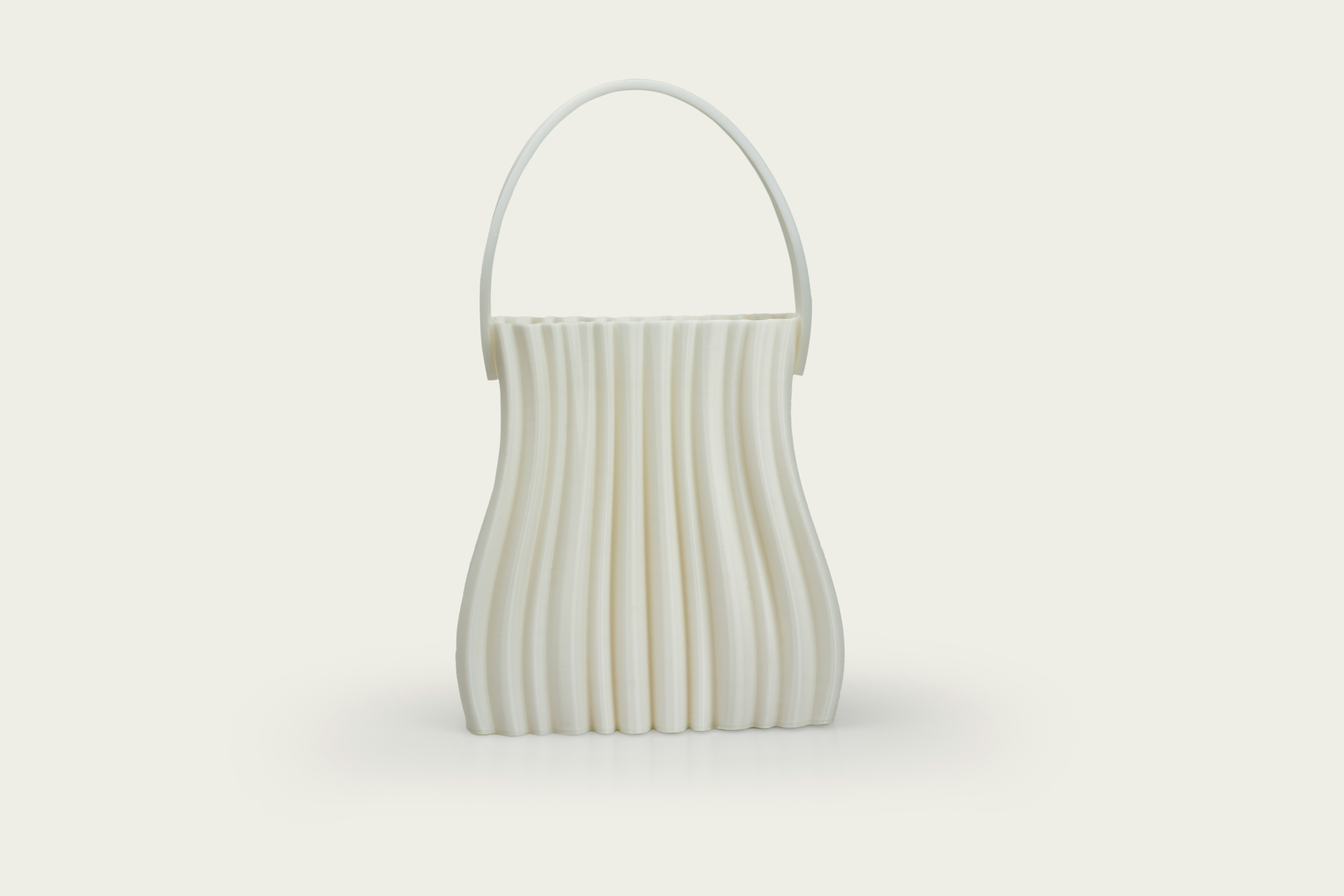 Quiet Pleats: A Minimal White Tote in Studio Light