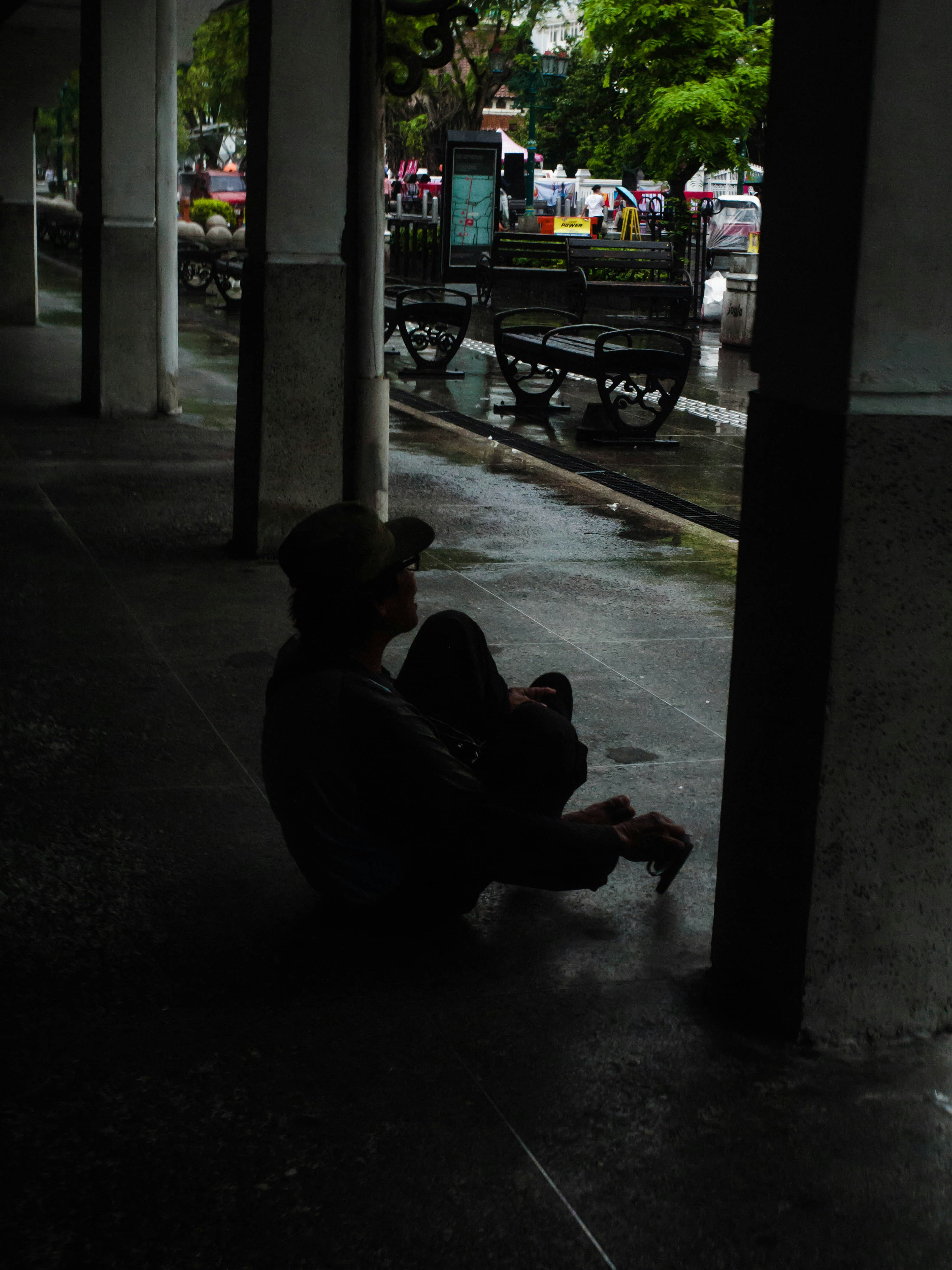 Reflections of Solitude in a Rainy Urban Landscape
