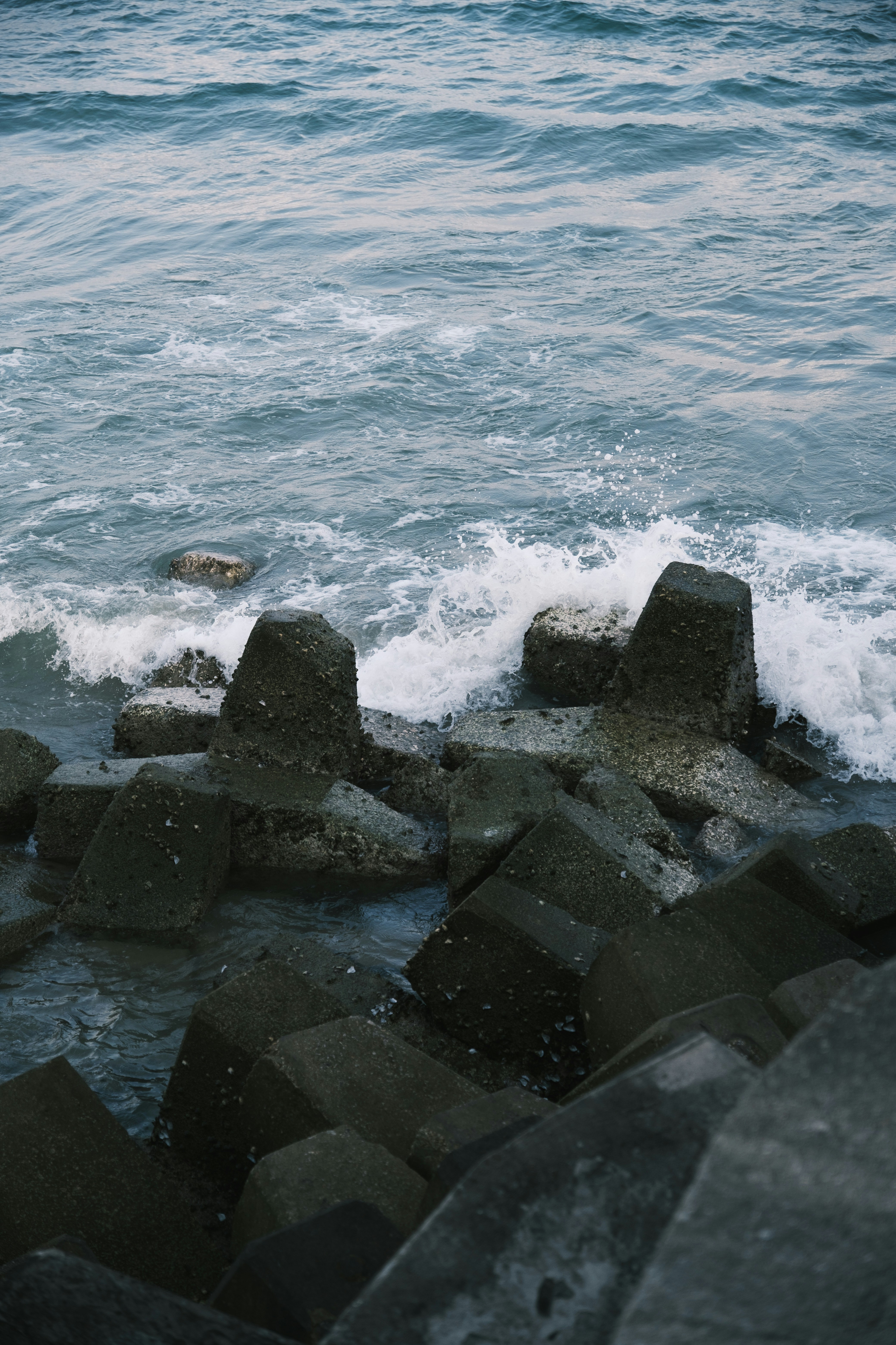 Rhythmic Embrace of Stone and Sea