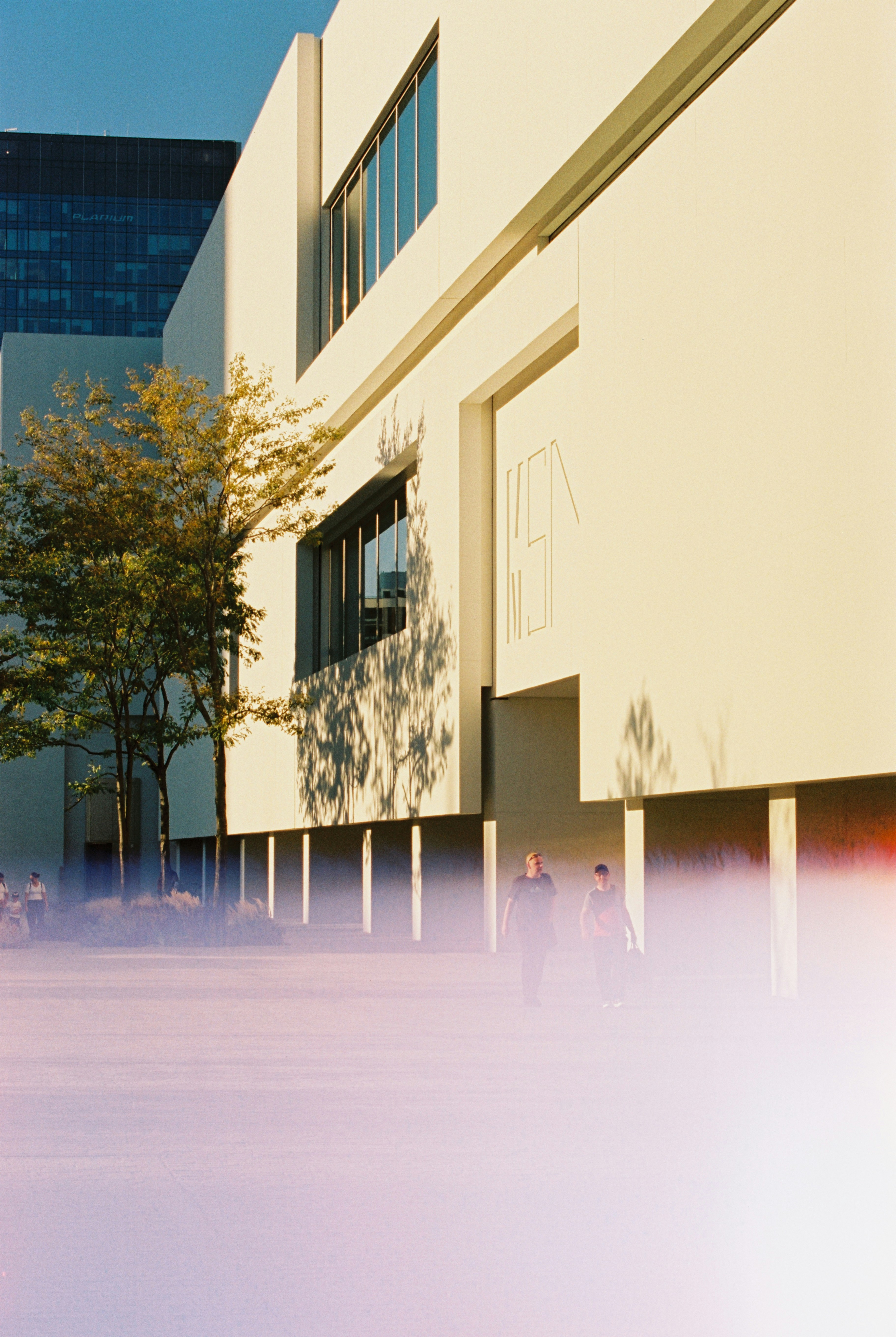 Modern building with people walking outside photo – Free Cityscape ...