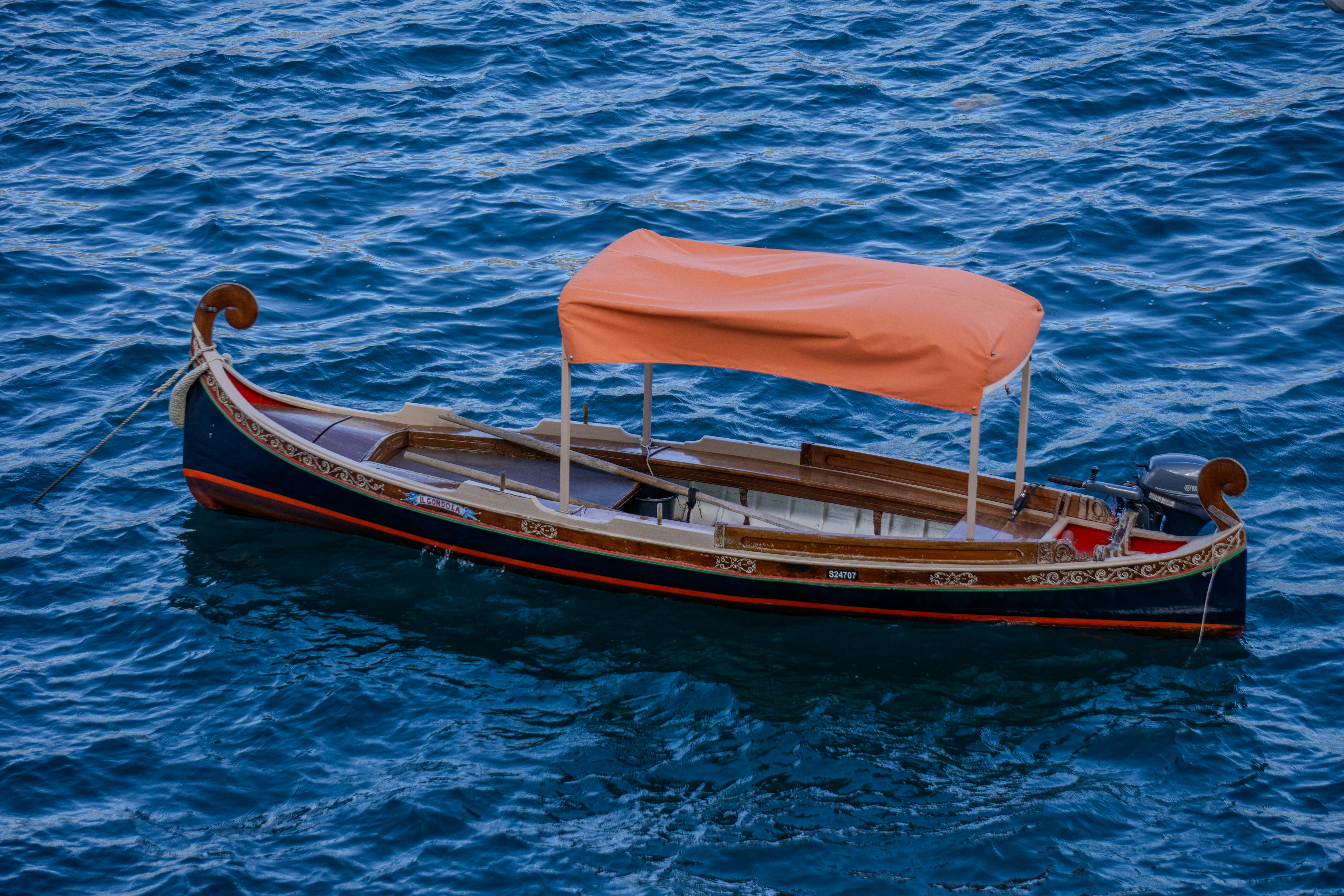 Serenity on the Waves: A Traditional Boat's Embrace