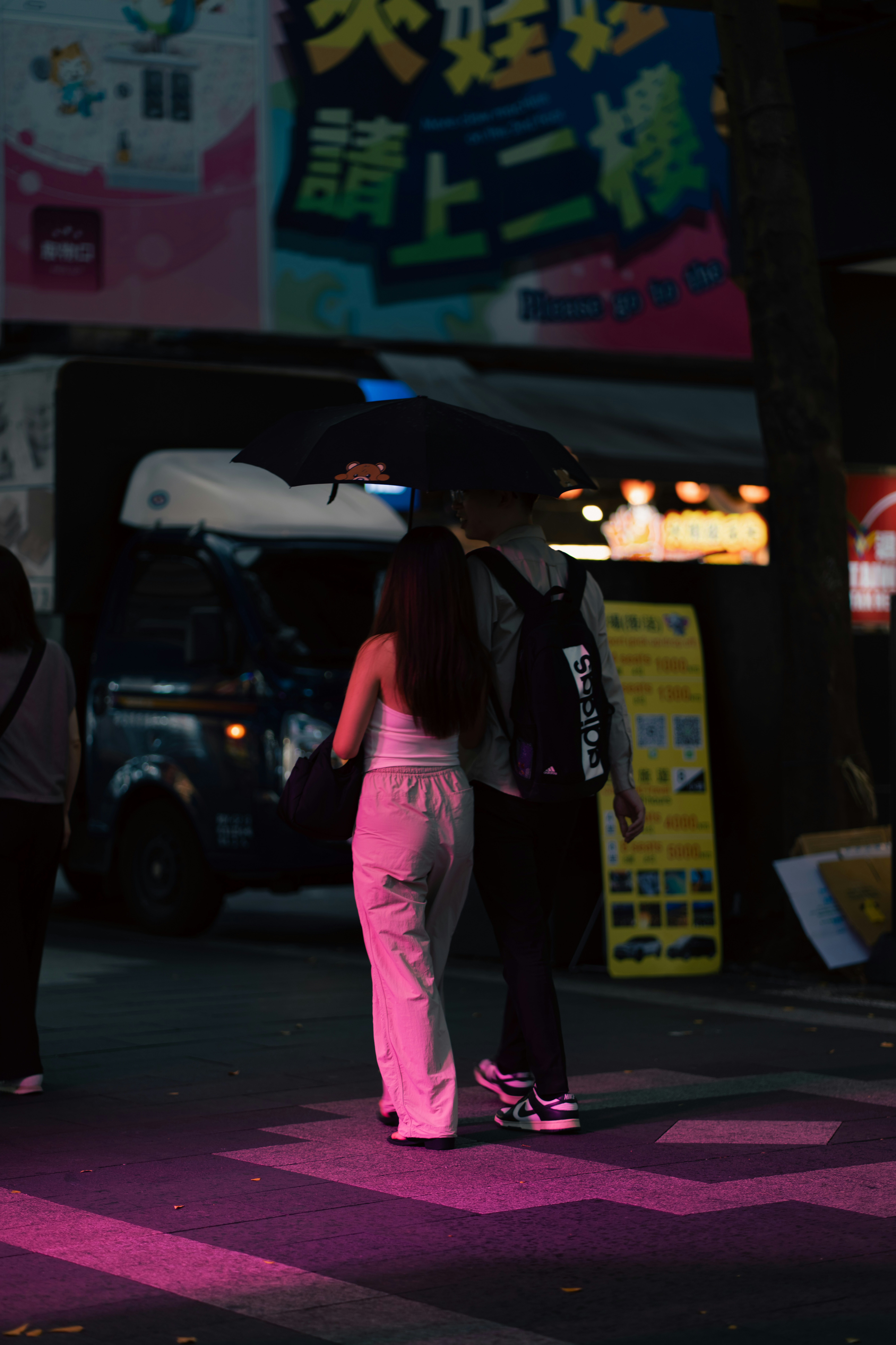 Umbrella Moments in Urban Twilight
