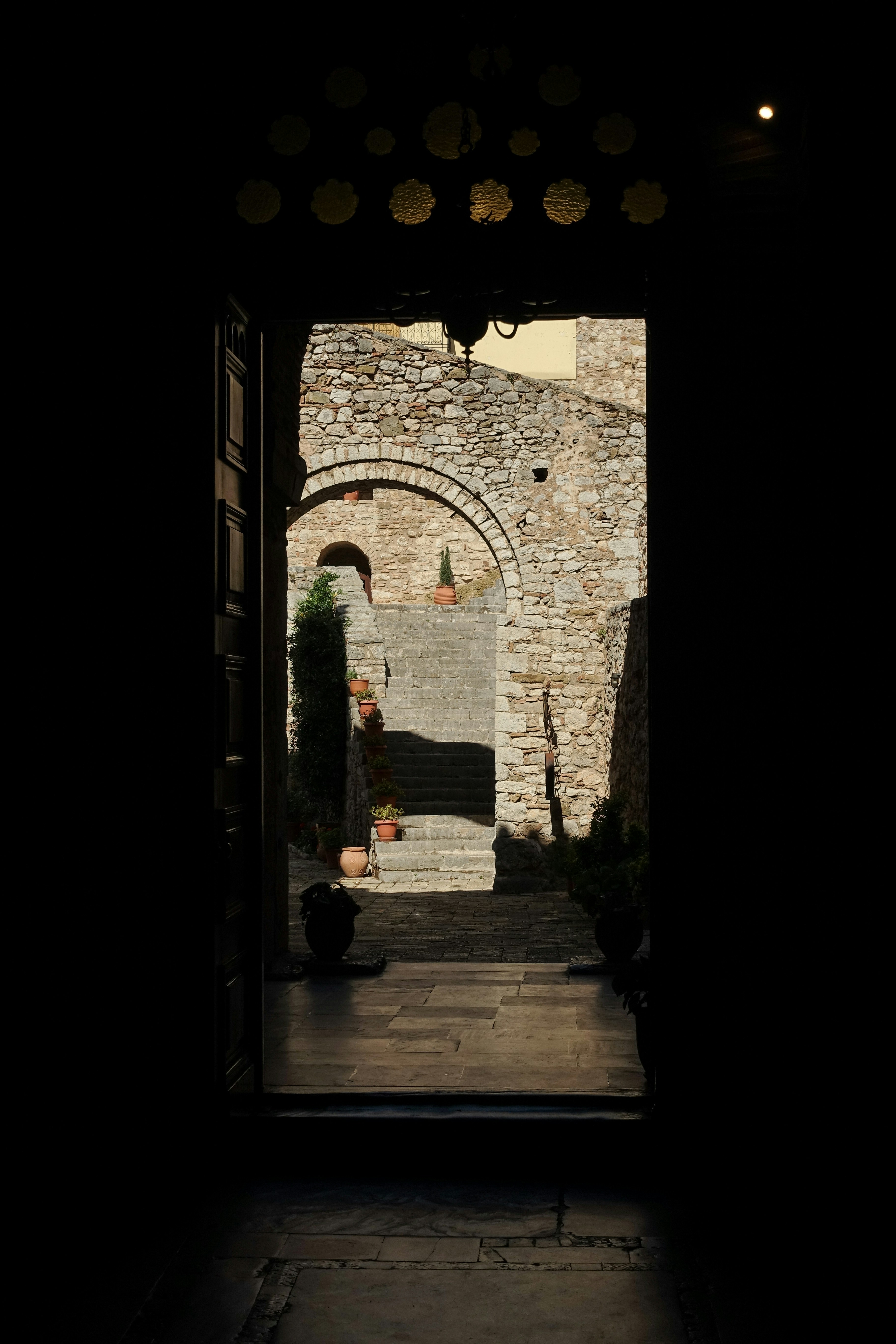 Whispers of History Through an Arched Doorway