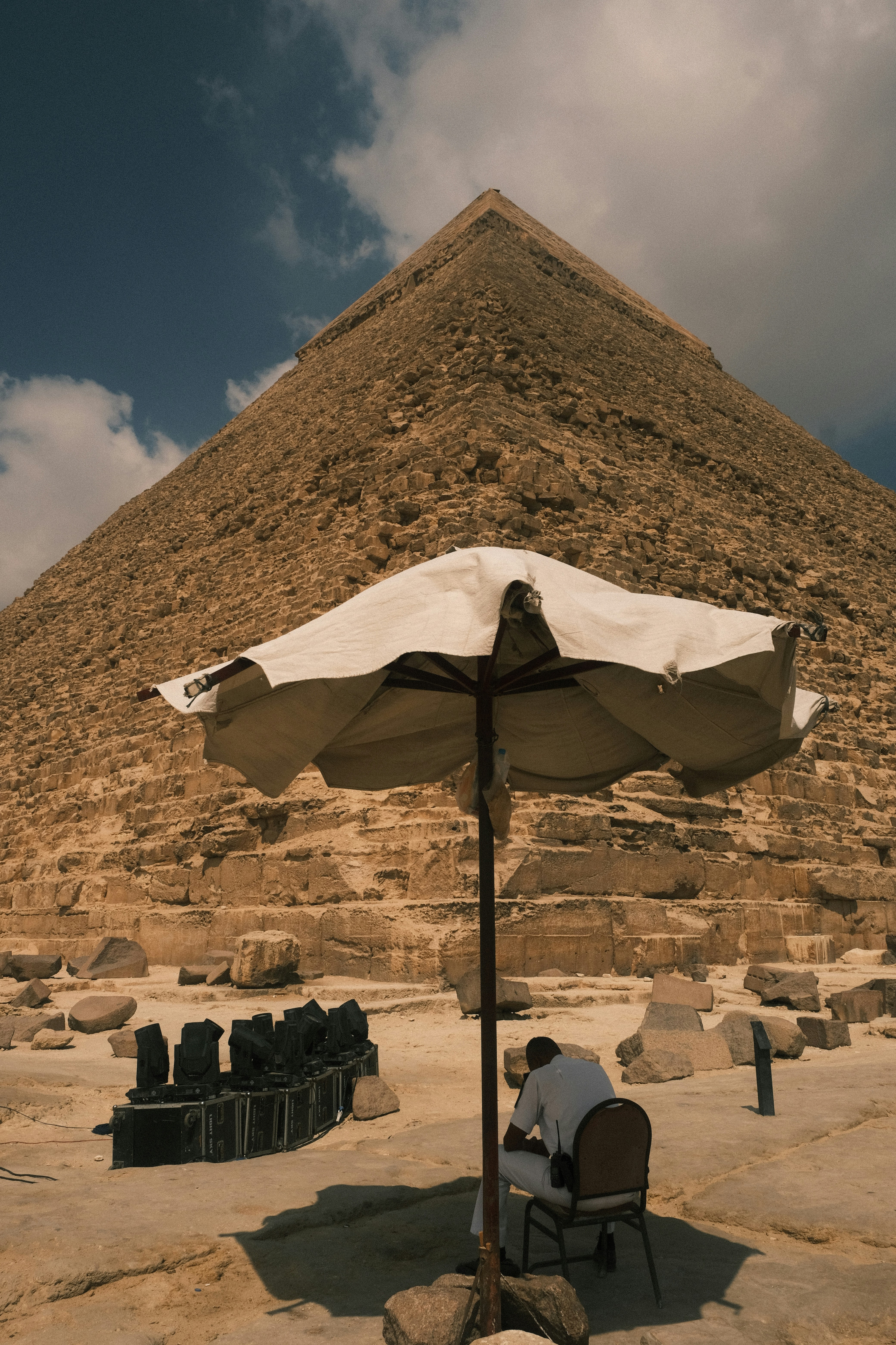 a police officer in front of the pyramids