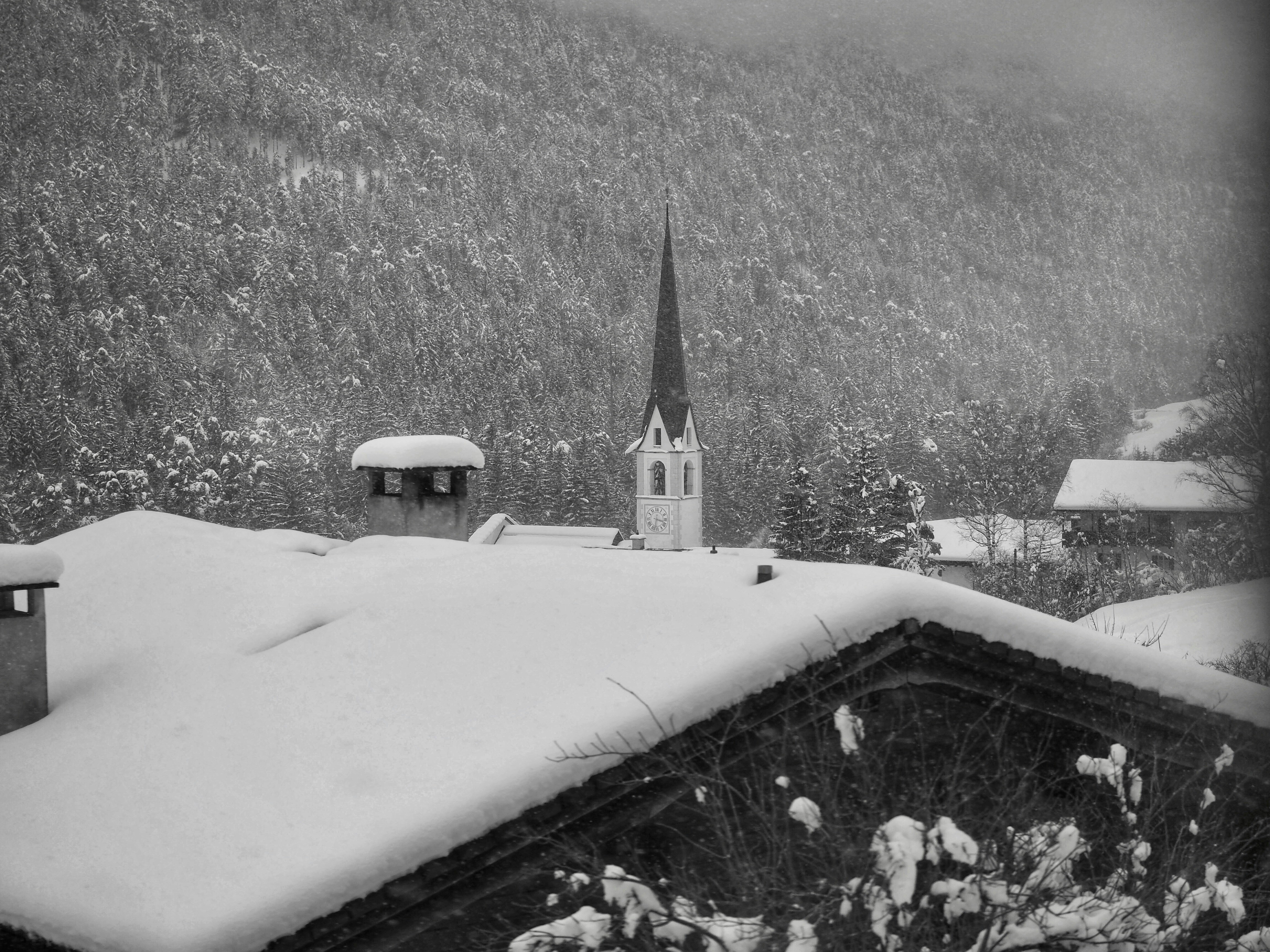 Silent Watcher: The Spire Amidst Winter's Embrace