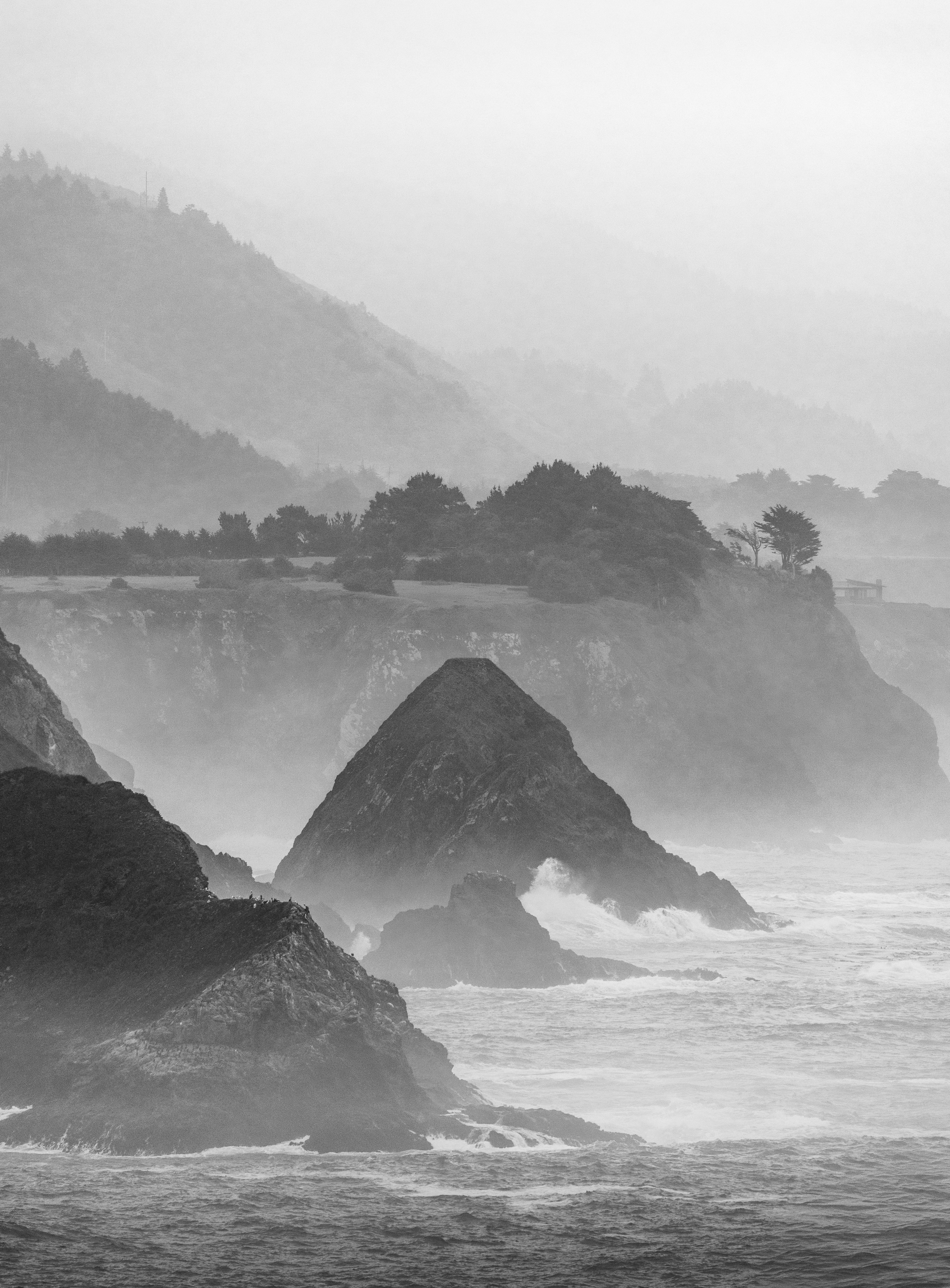 Misty Sea Stacks: Quietitude Along the Cliff Face