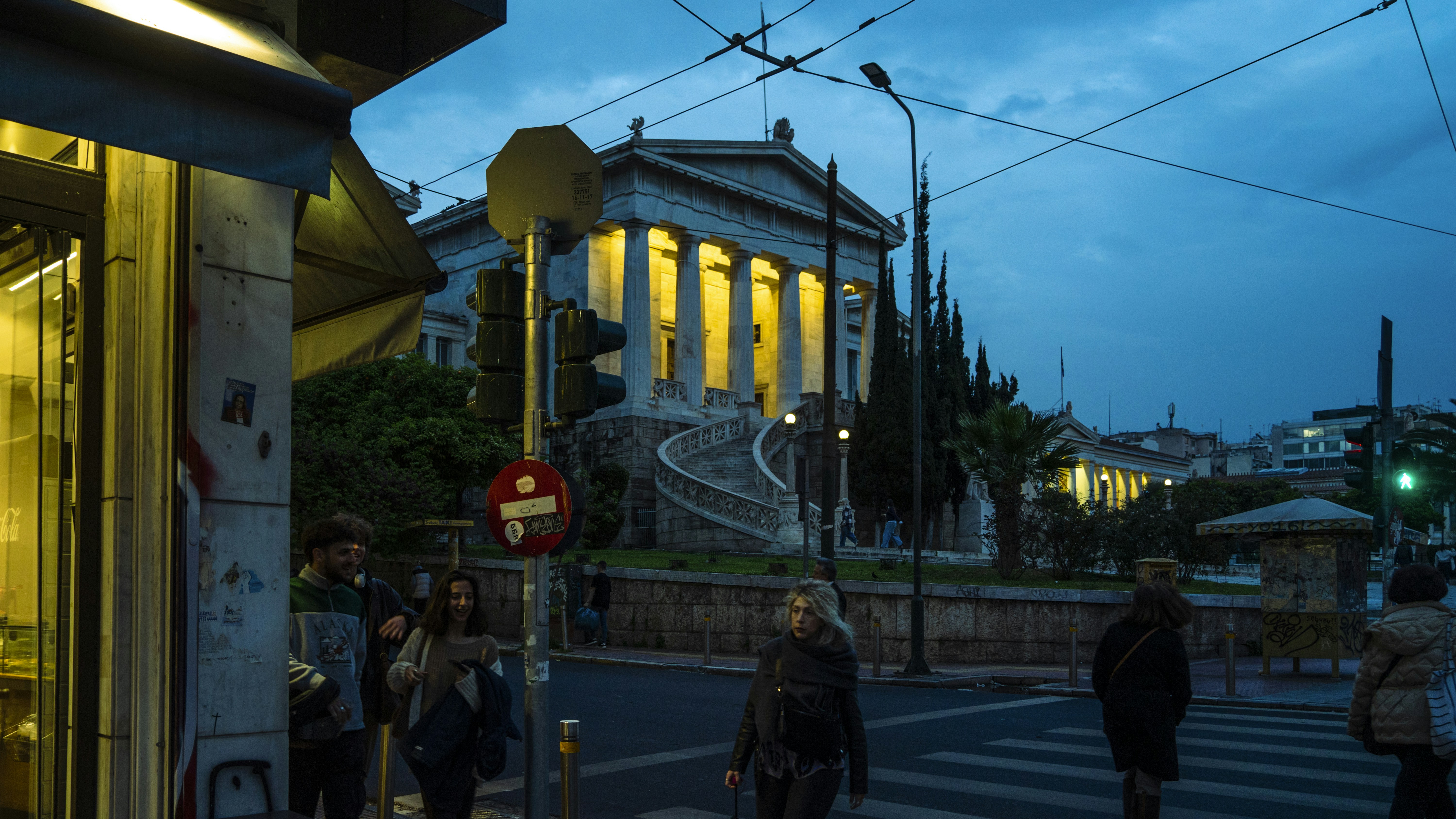 Blue Hour by the Colonnade Staircase: Pedestrians Cross Toward a Hilltop Monument