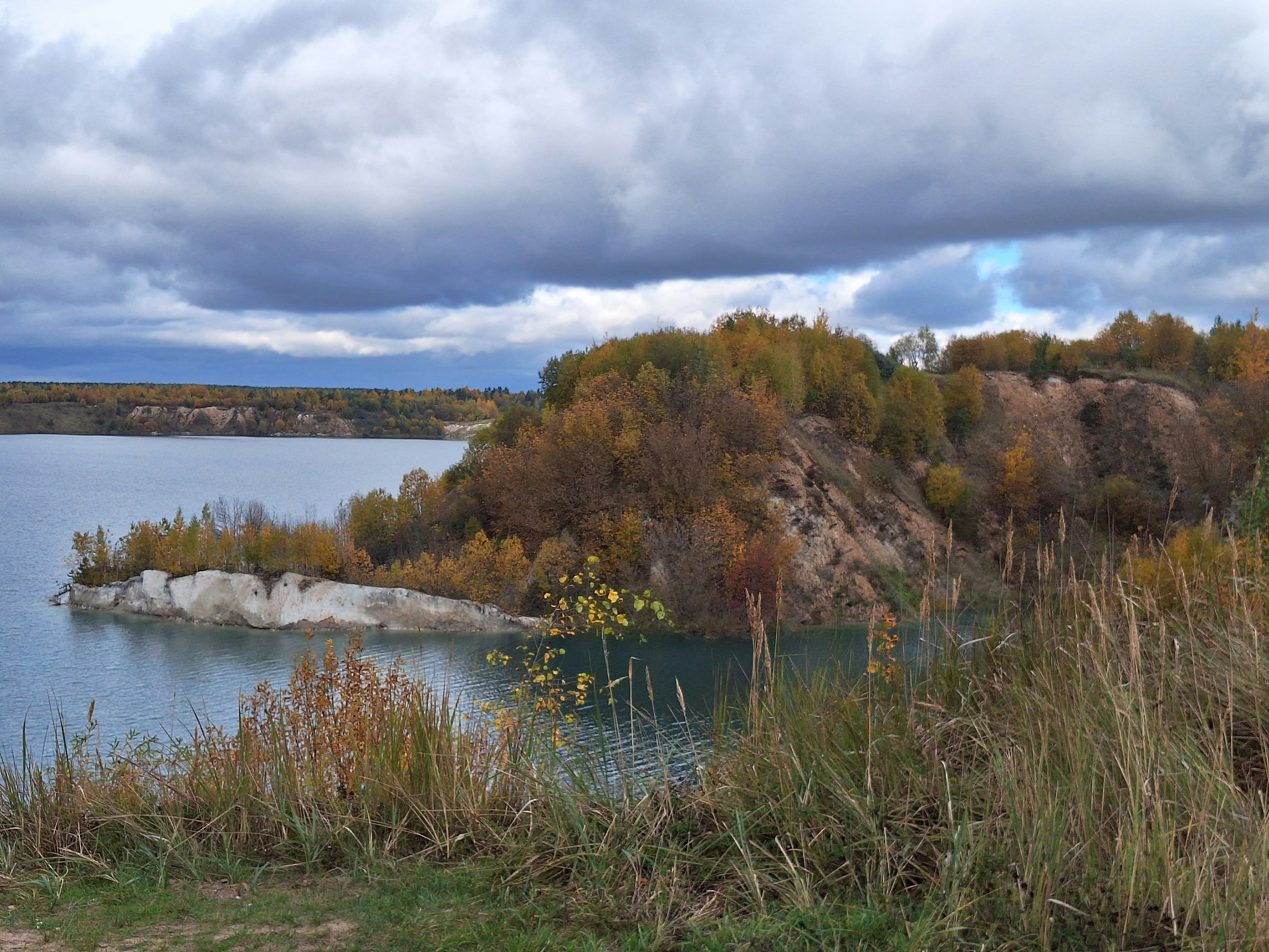 Autumn's Embrace Over Tranquil Waters