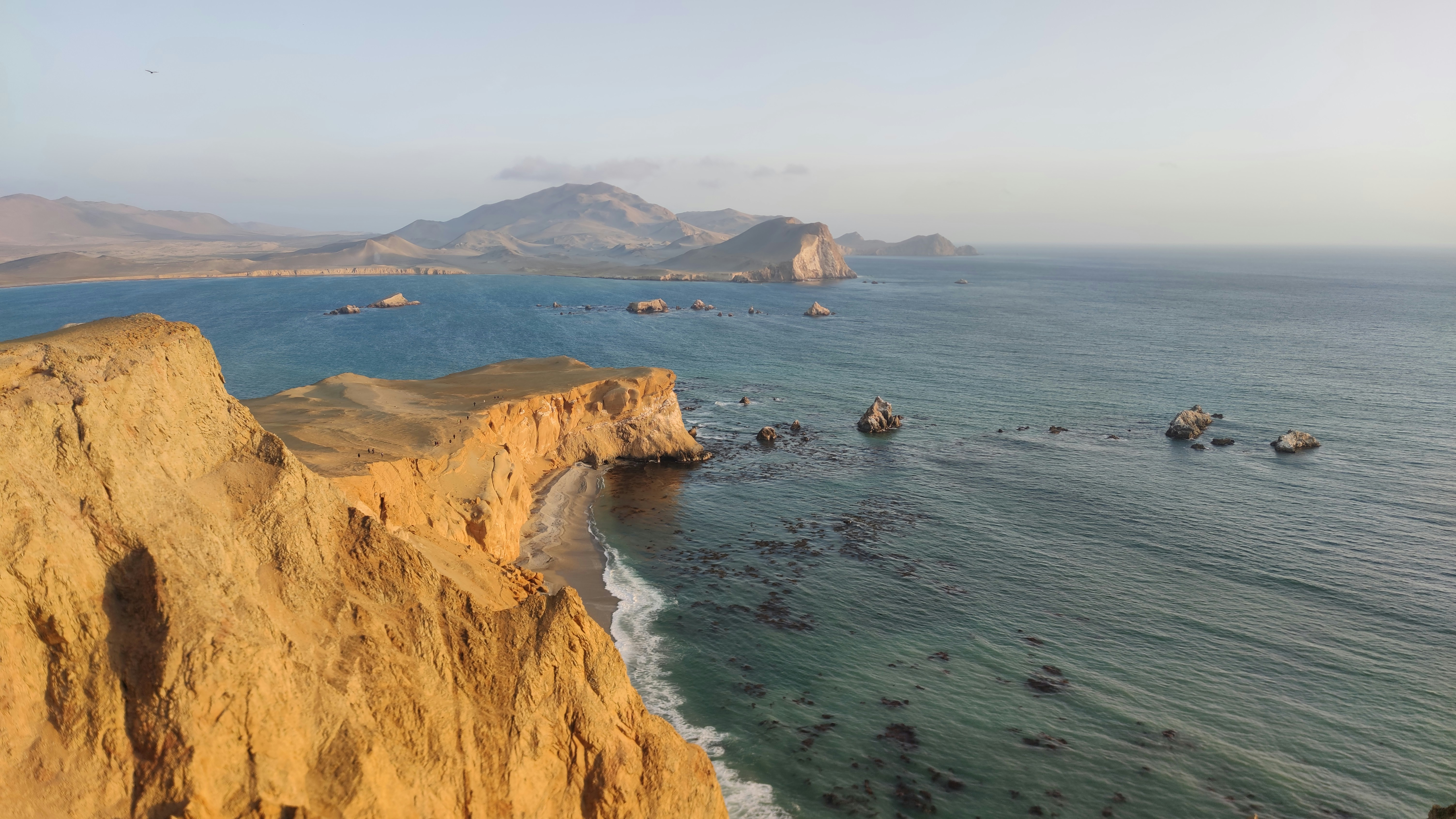 Reserva Nacional de Paracas, Perù ~ 11 August 2025 | Coastal cliffs with ocean and distant mountains