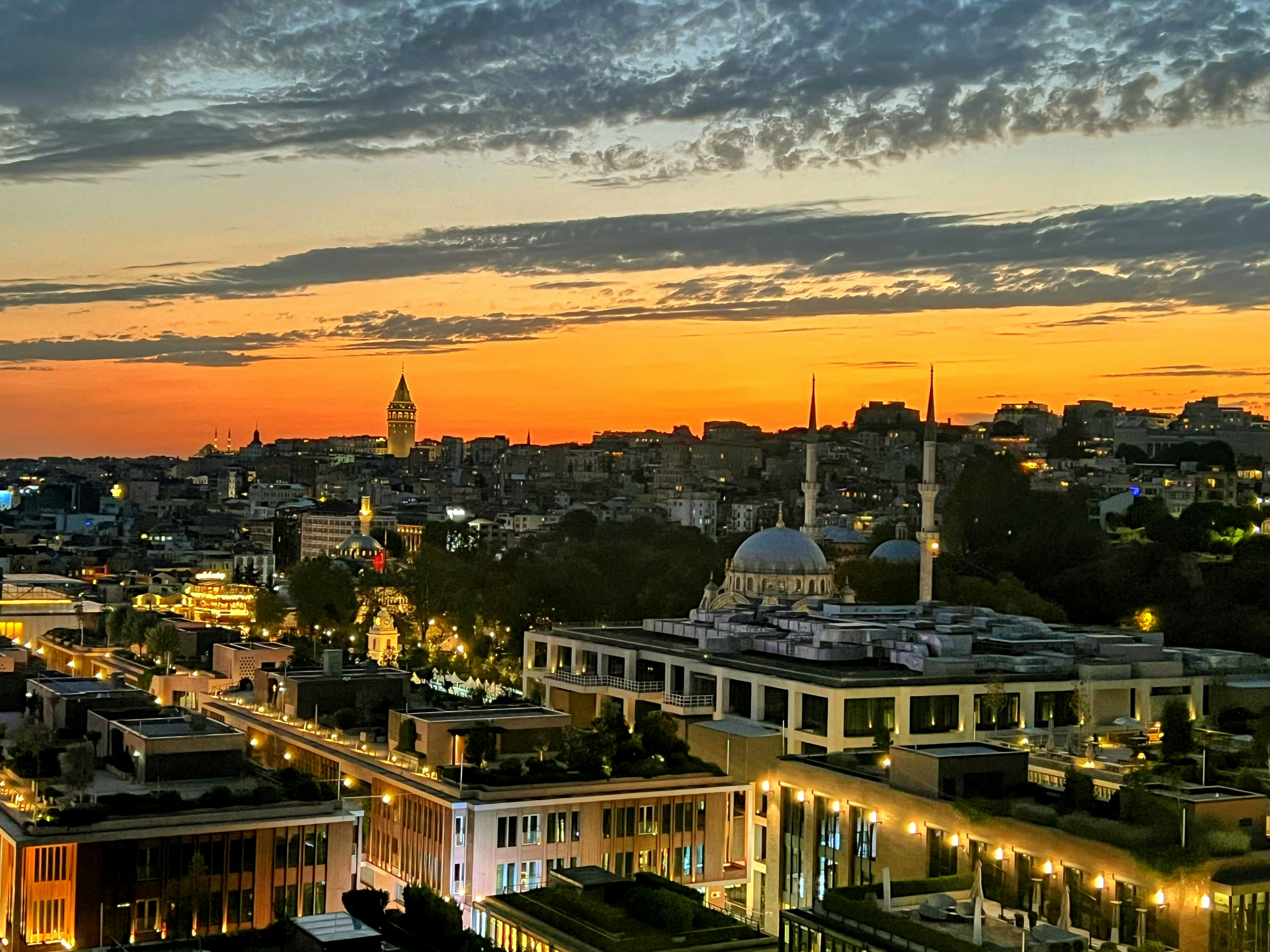 Breathtaking sunset views in Istanbul | City skyline at sunset with mosque and tower.