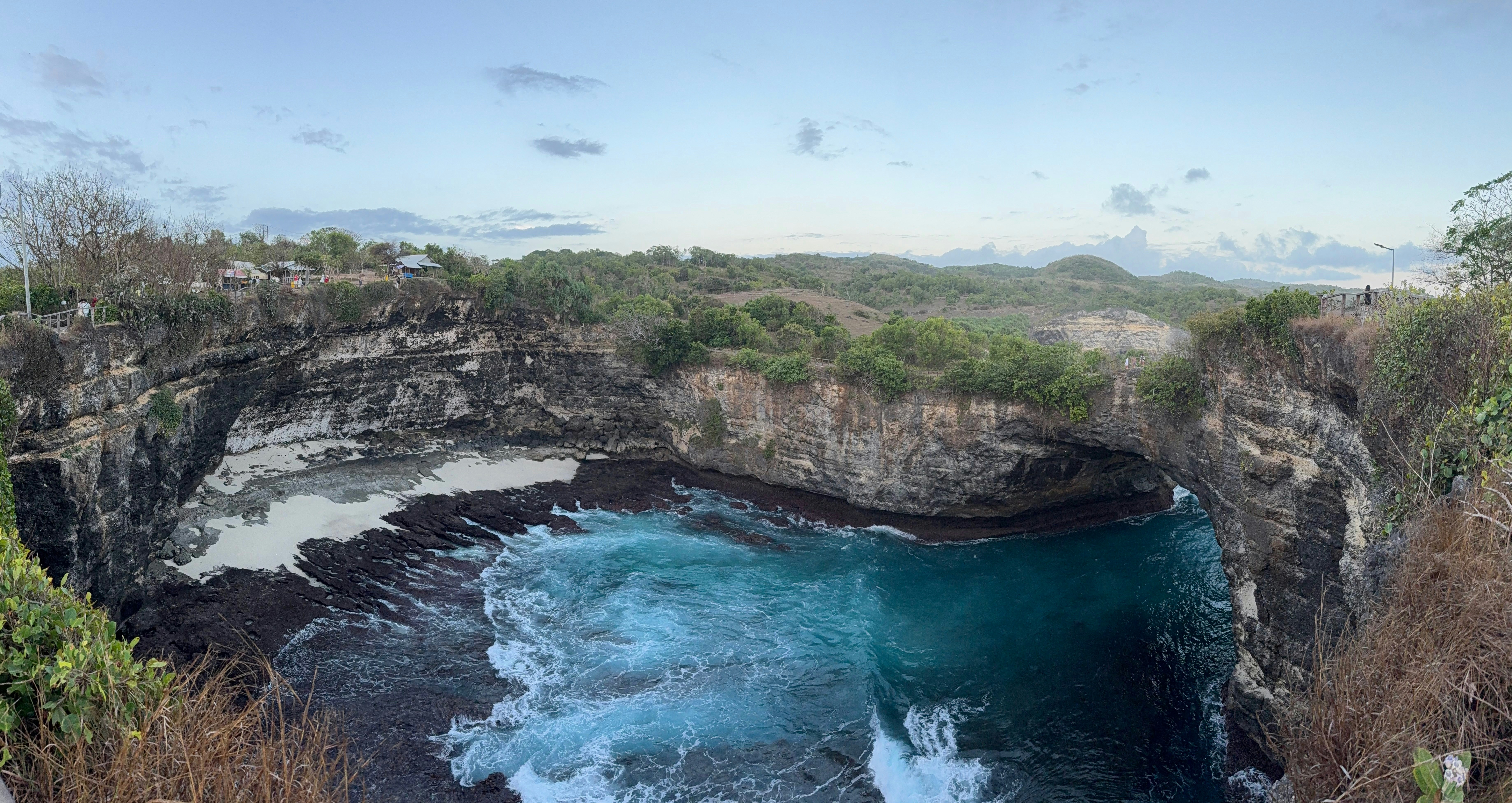 The Serene Embrace of Ocean and Rock