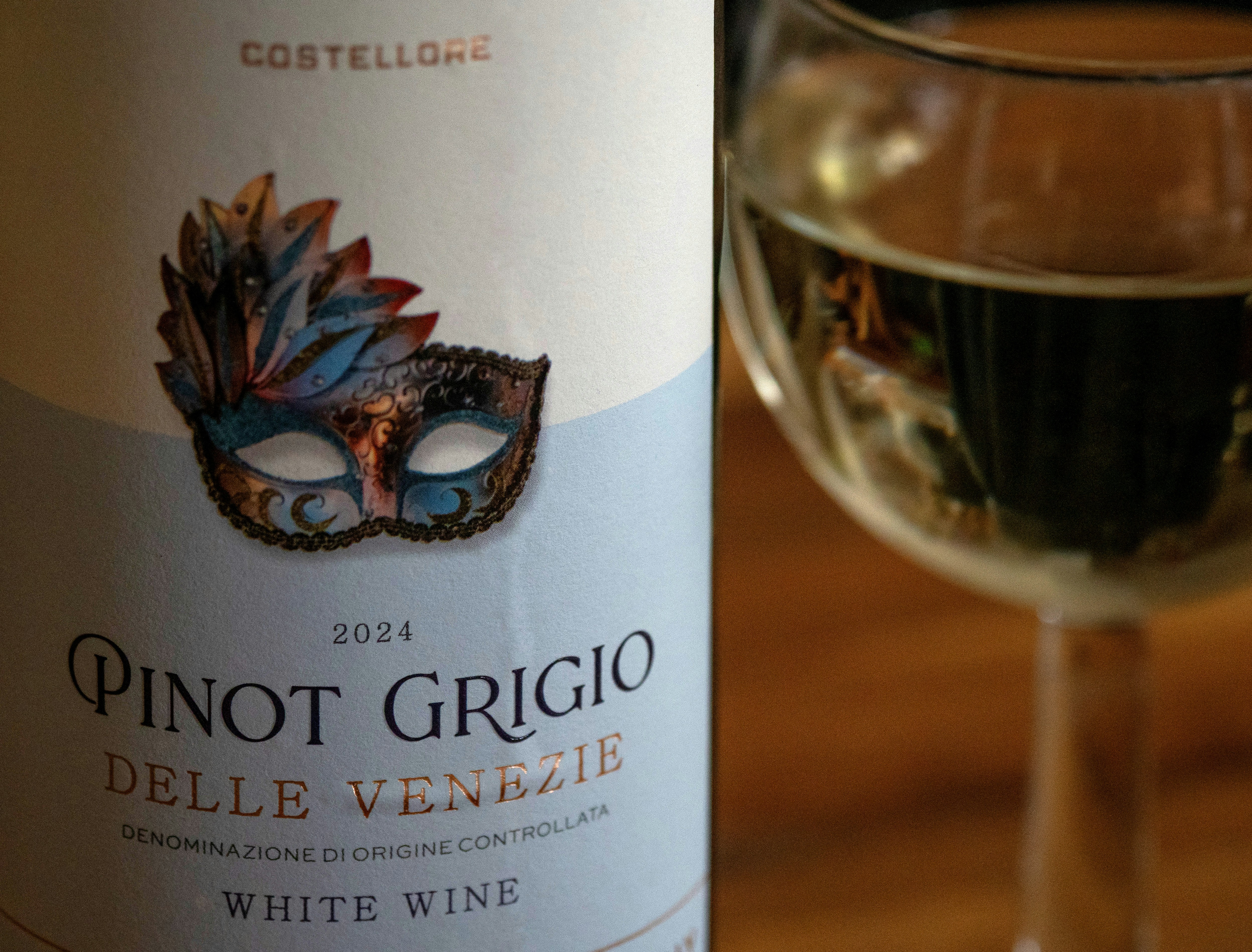White wine | Bottle of pinot grigio with a glass of wine.