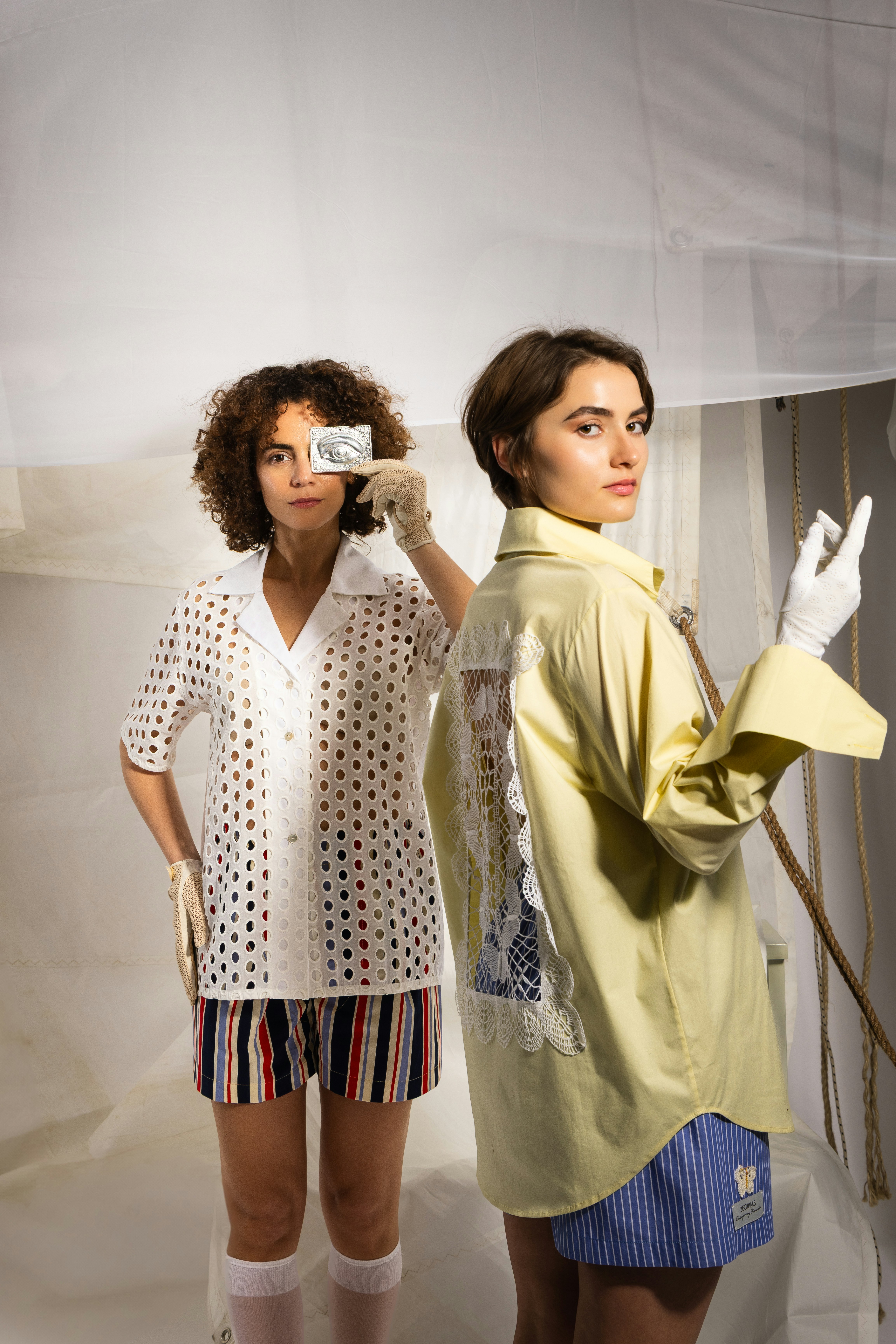Contrast in Fabric and Light: Studio Duo in White Crochet and Yellow Silk