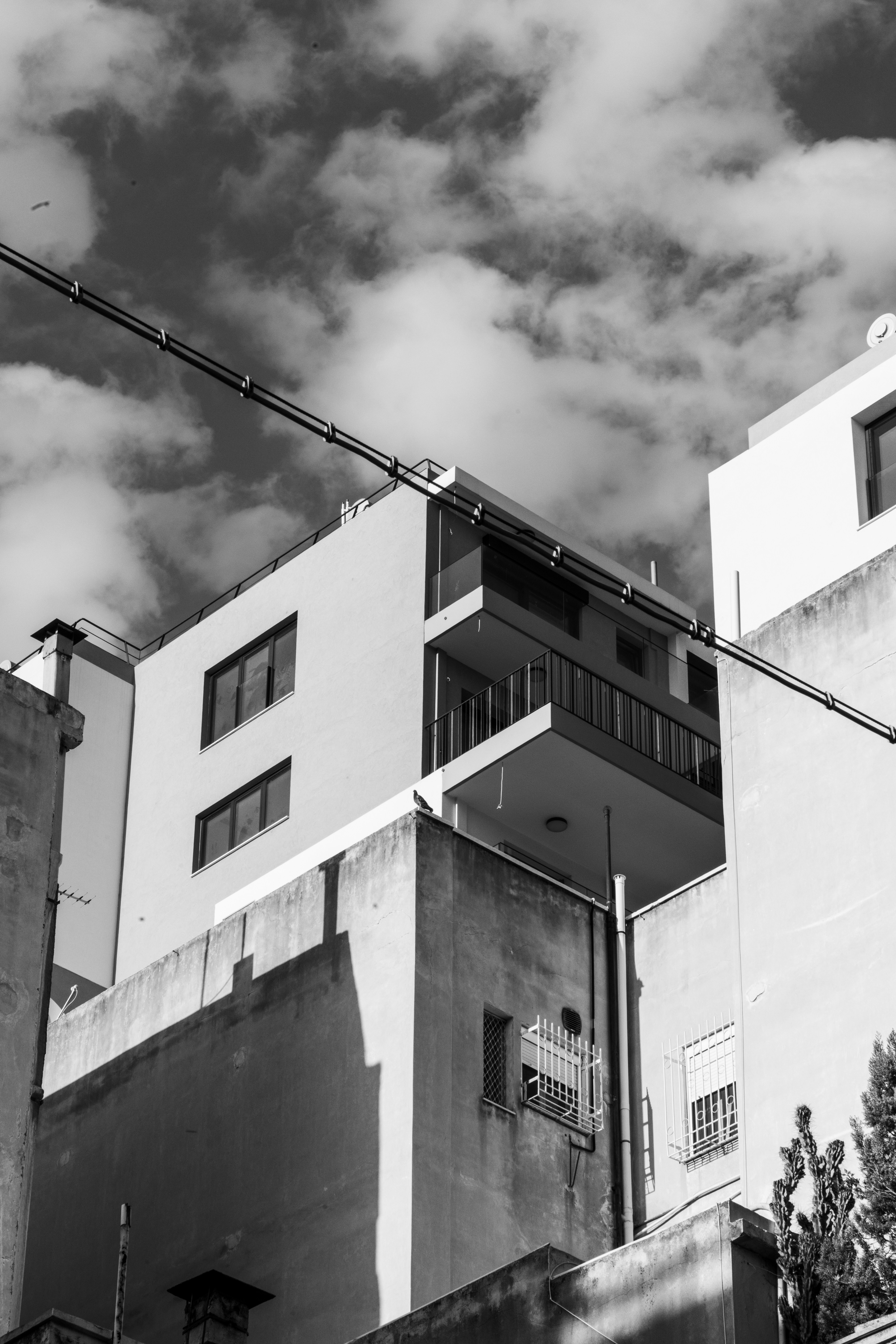 Modern buildings against a cloudy sky