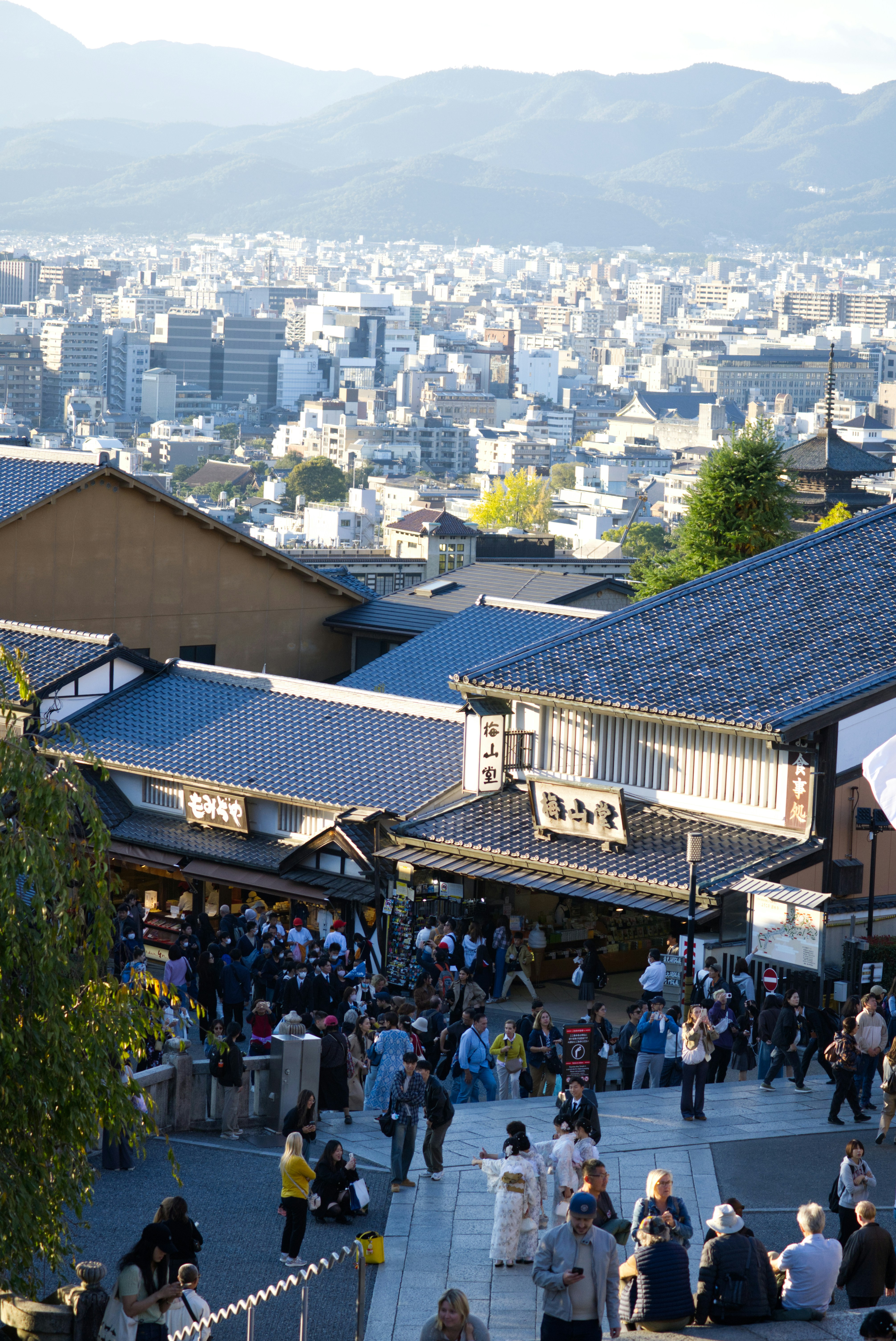 Kiyomizu-dera, Japan | Crowded street with traditional japanese buildings and cityscape.