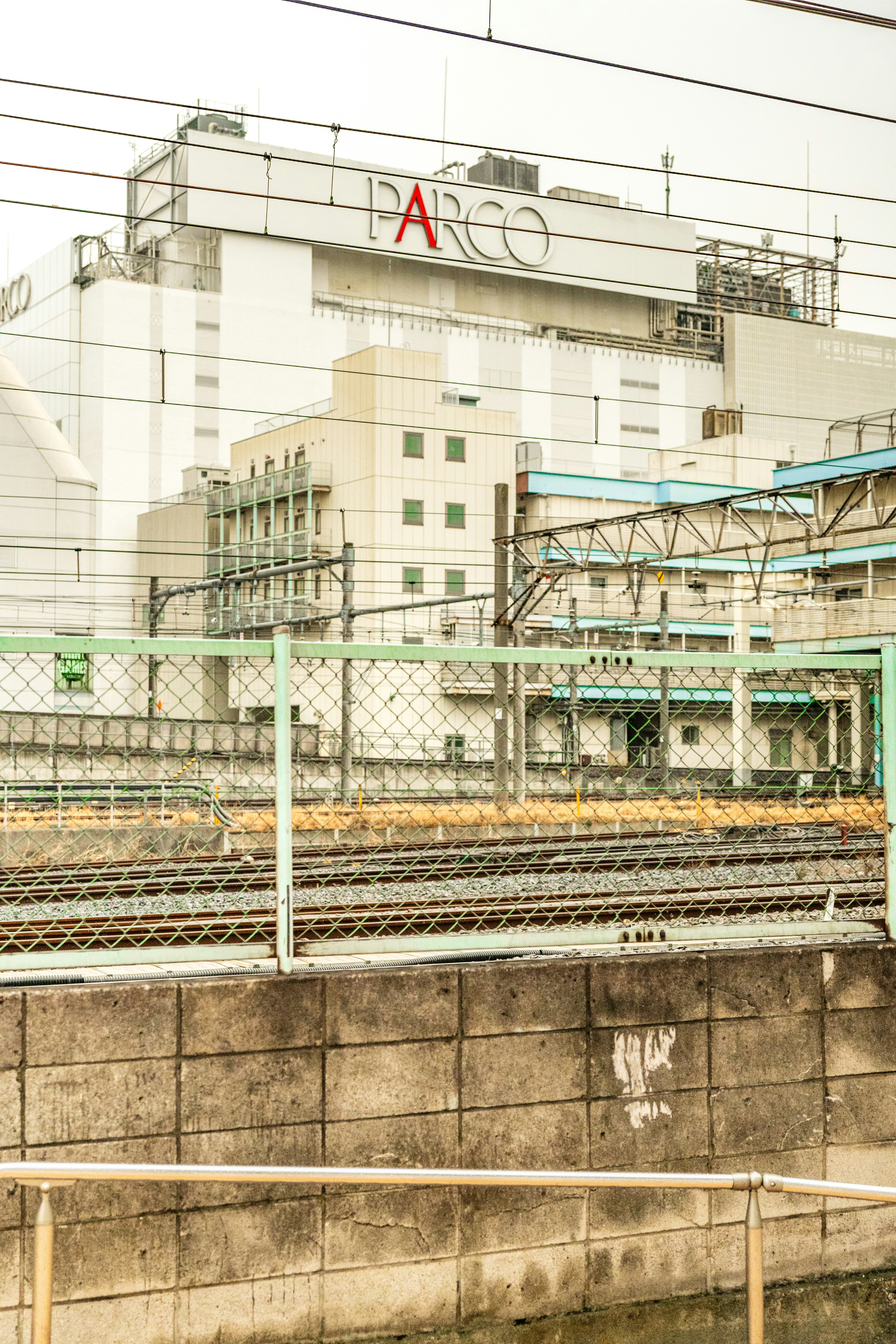Modern buildings with the parco logo visible.
