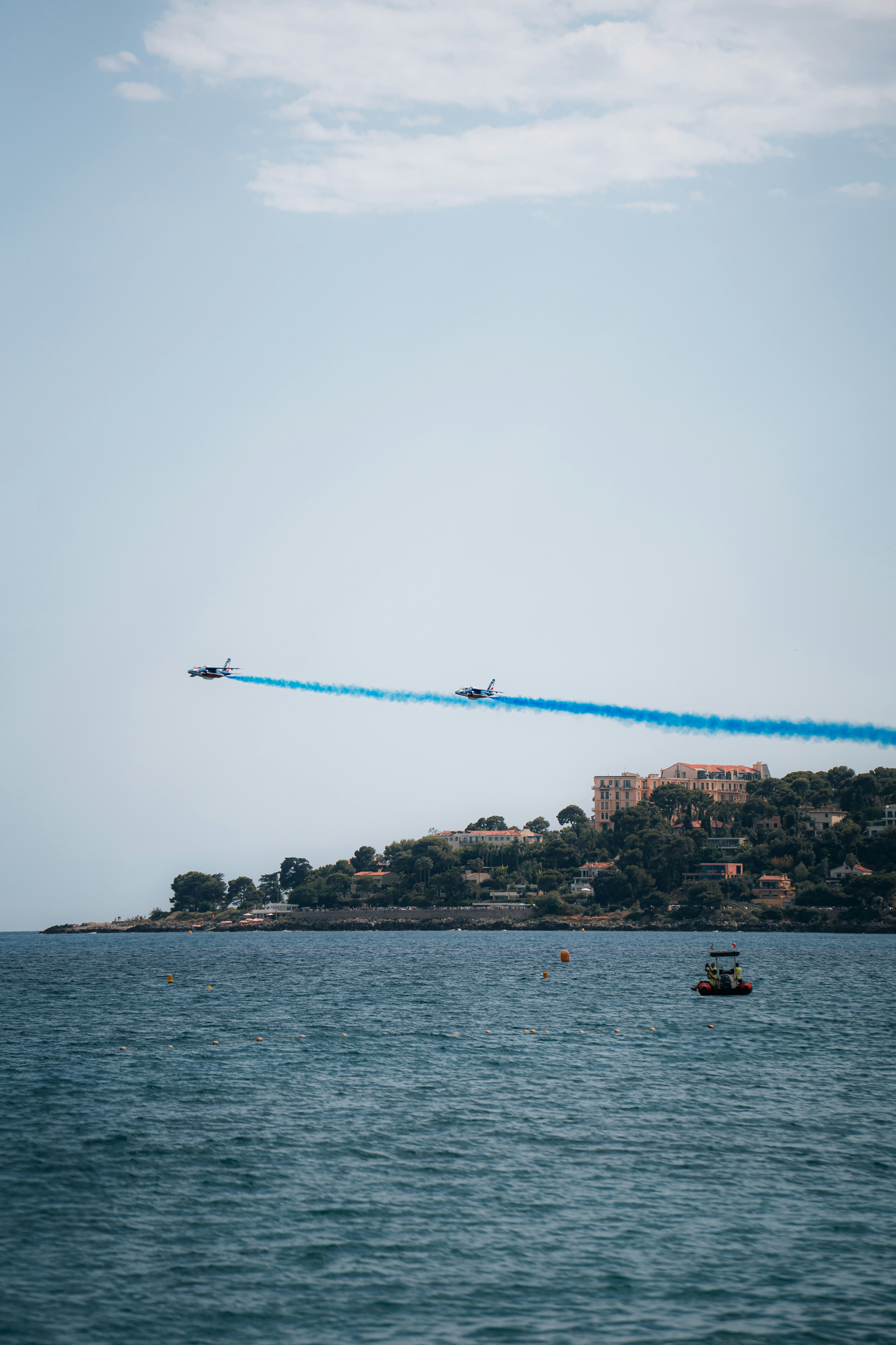 Blue Trails over a Coastal Air Show