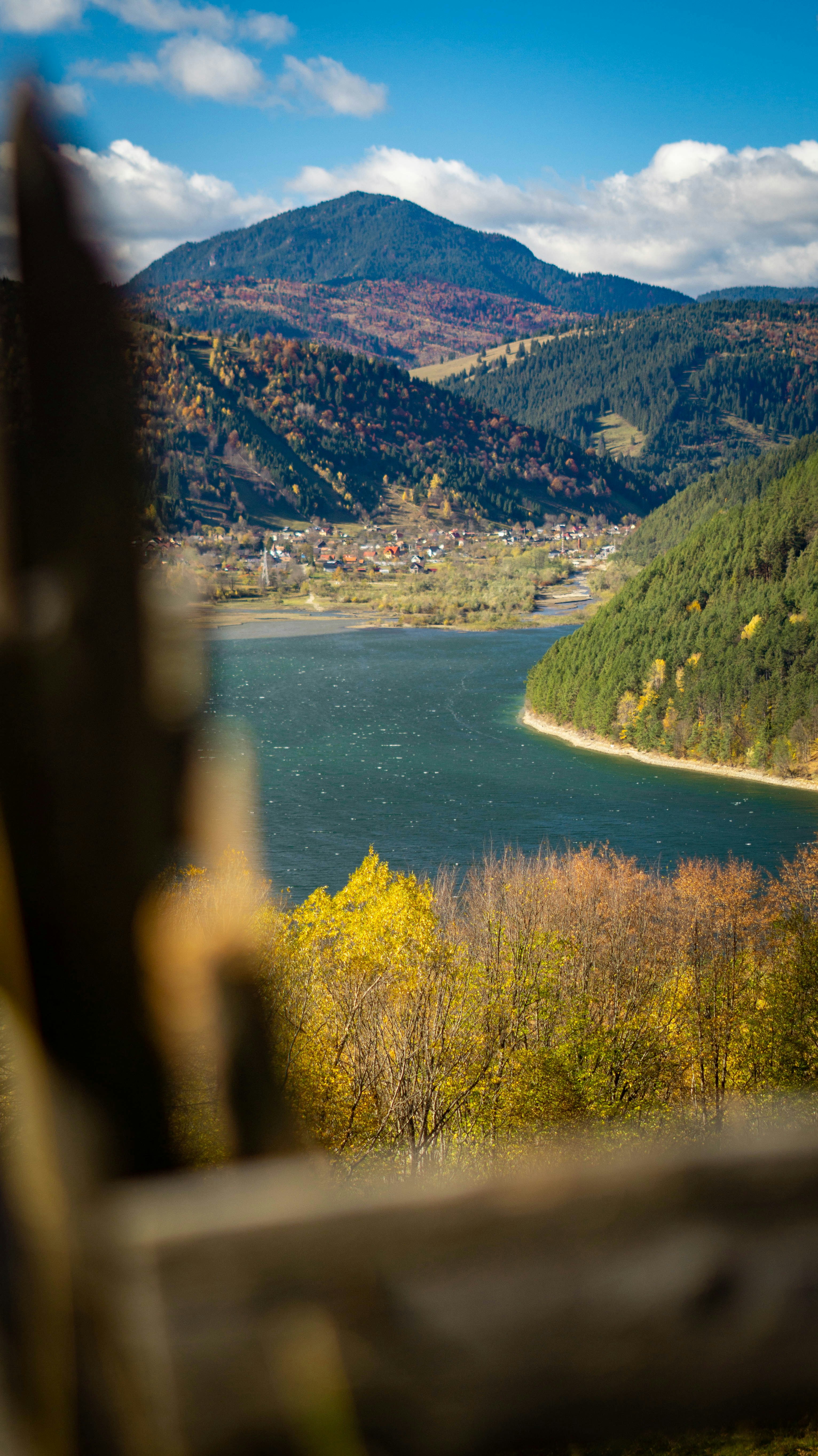Autumn's Embrace: A River's Journey through Vibrant Valleys