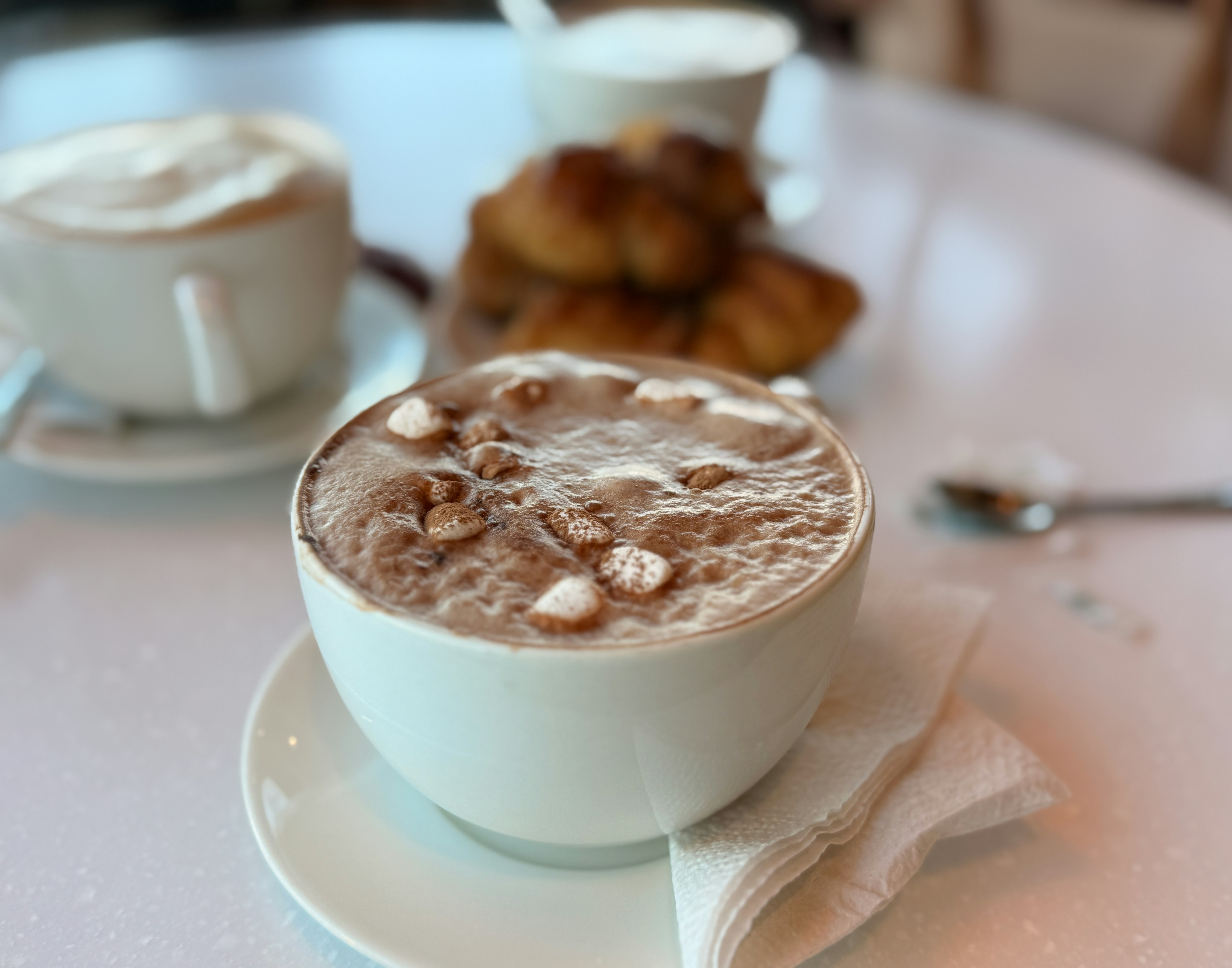 A Cozy Moment: Warm Cocoa and Fresh Pastries