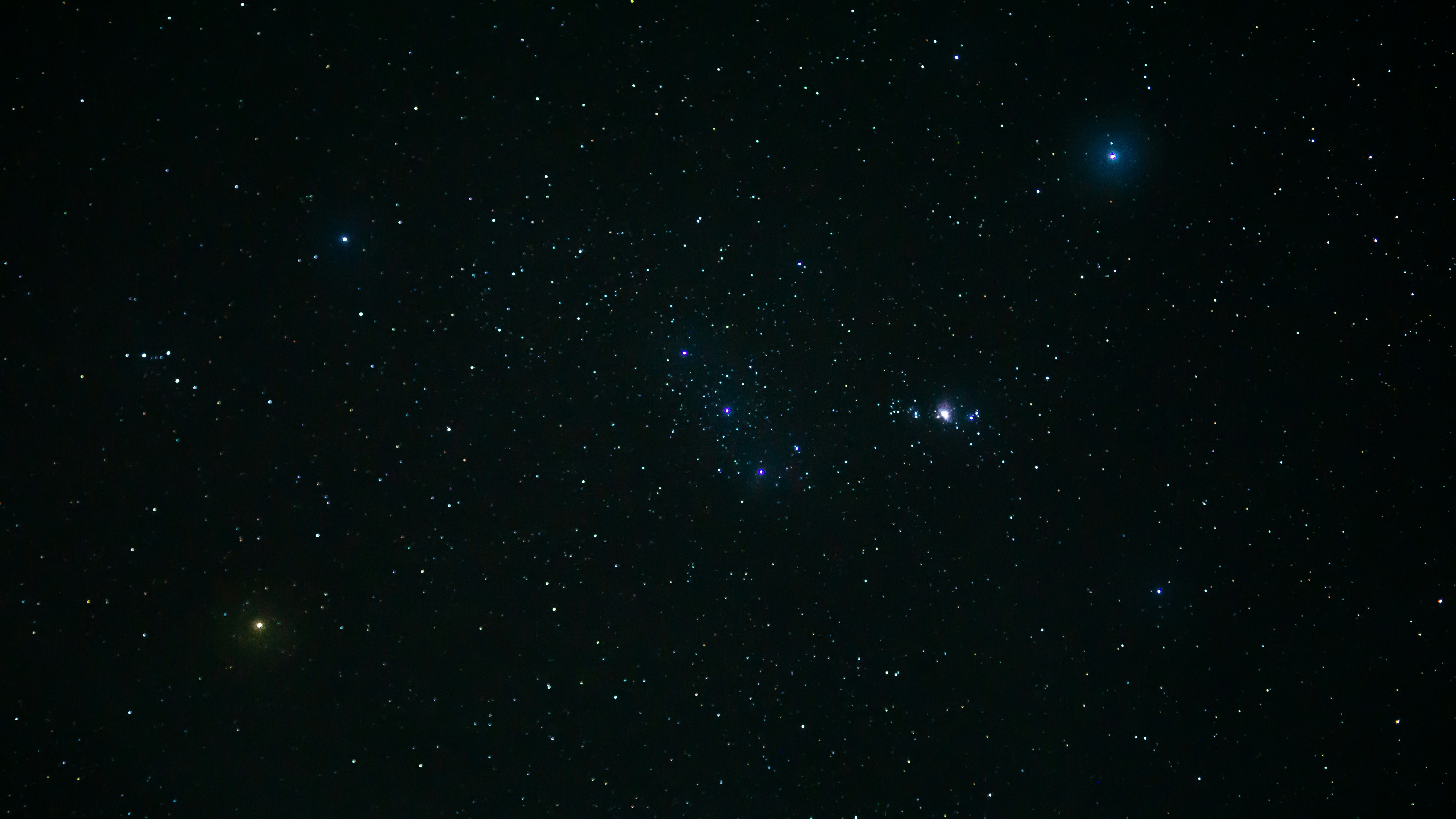 Orion constellation | A dark sky filled with countless stars.