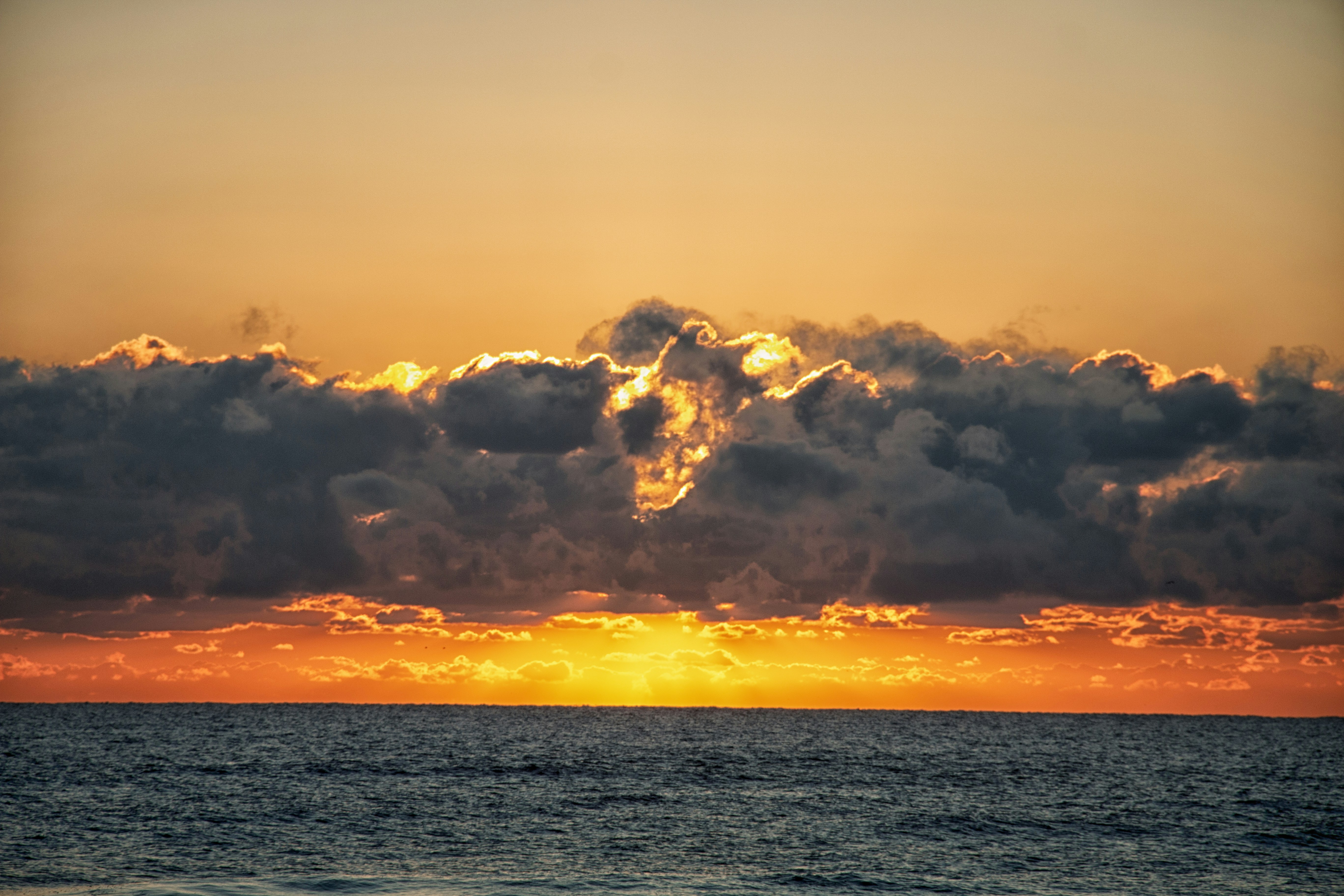 The Horizon's Embrace: A Sunset Symphony