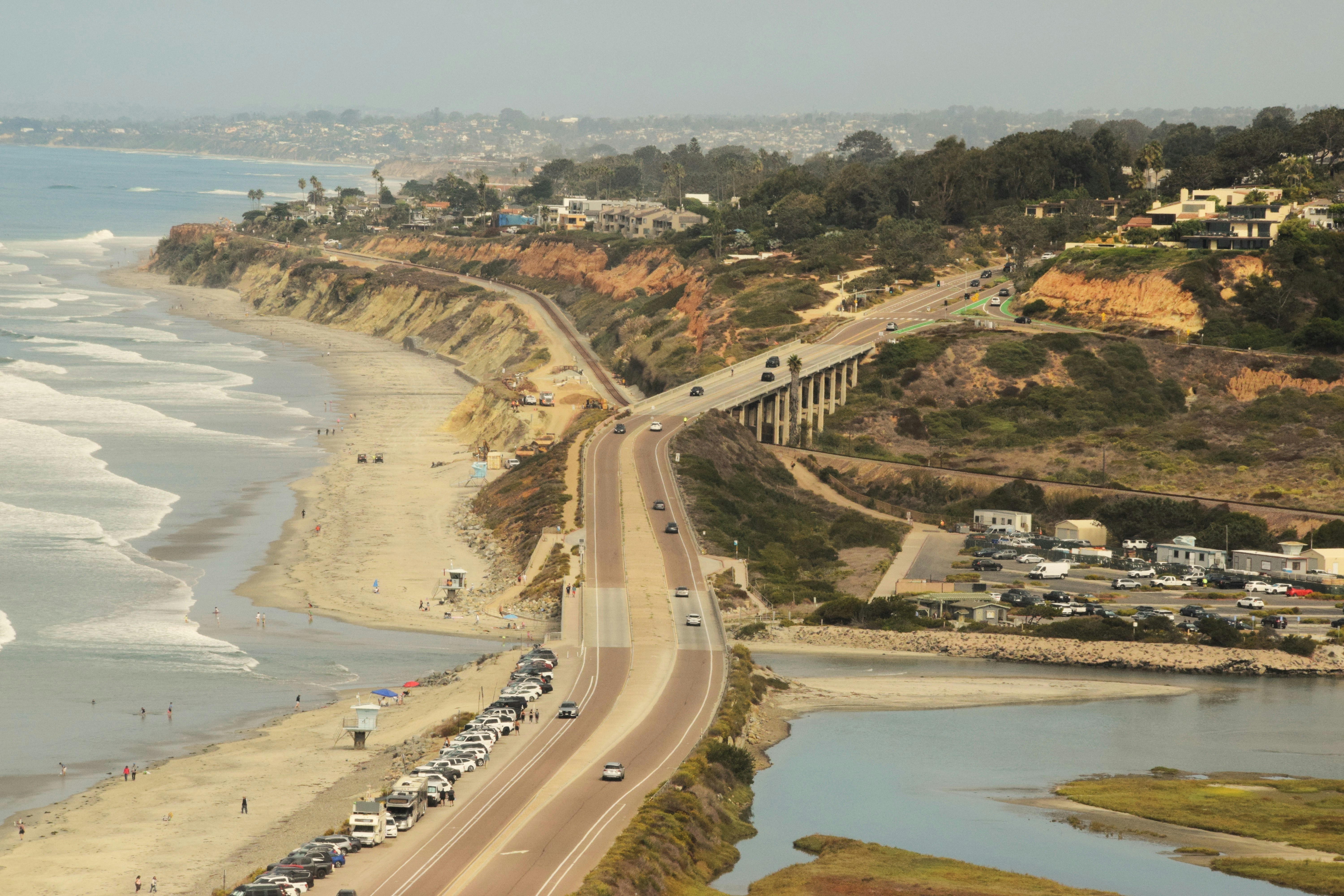 Coastal highway with ocean and estuary views. photo – Free Beach Image ...