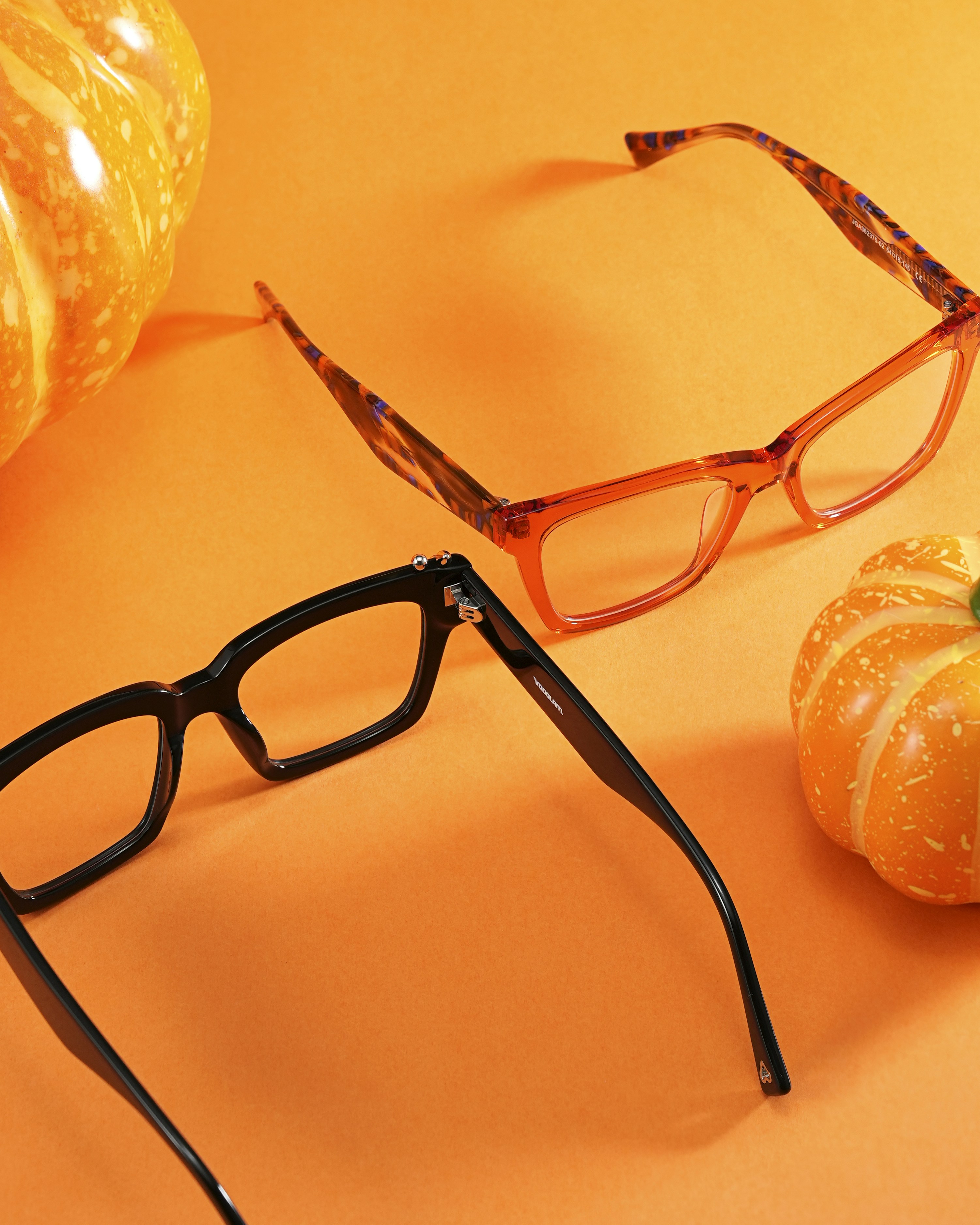 Tangerine Frames: Glasses Take Center Stage Among Mini Oranges