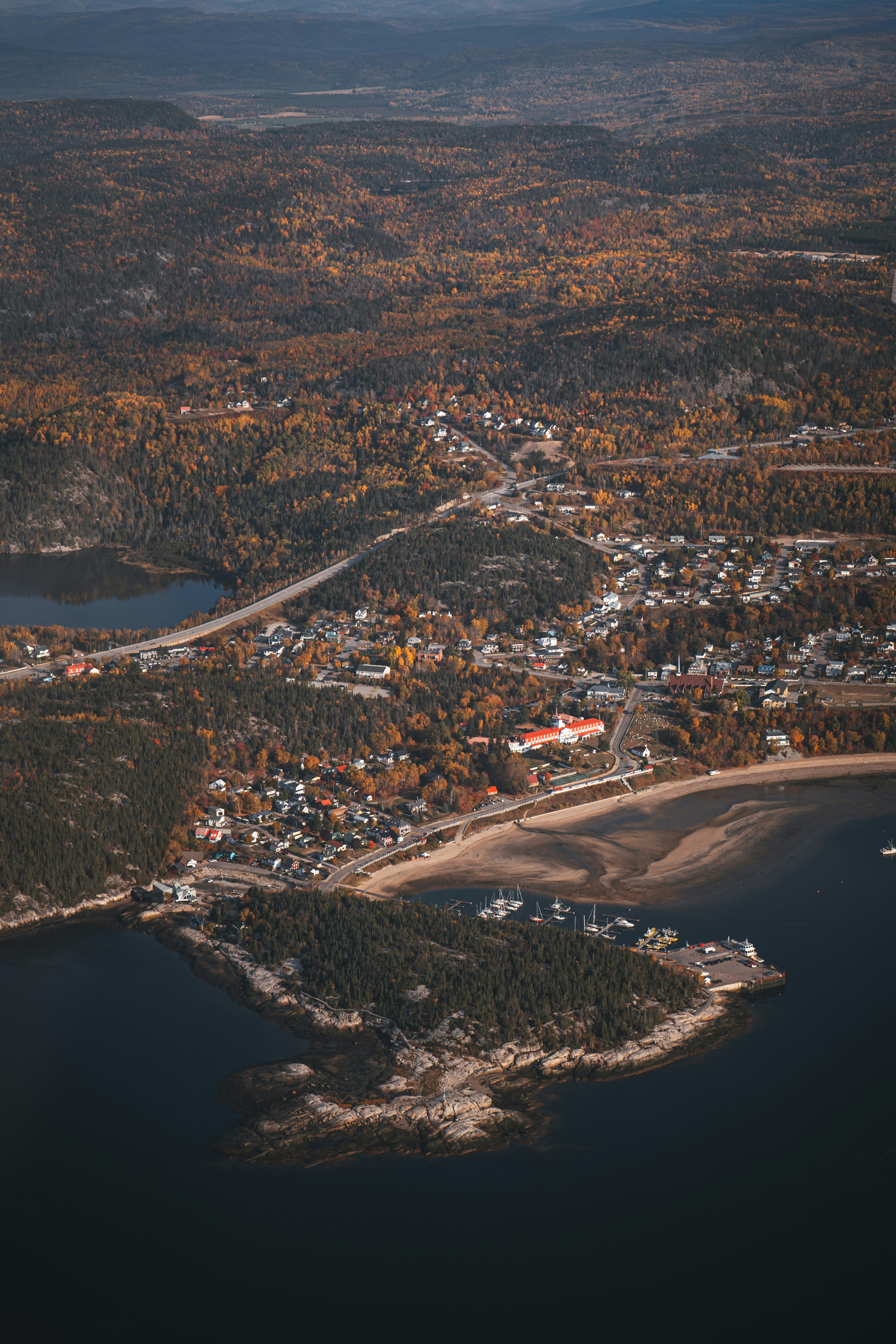 Autumn's Embrace Over Coastal Serenity