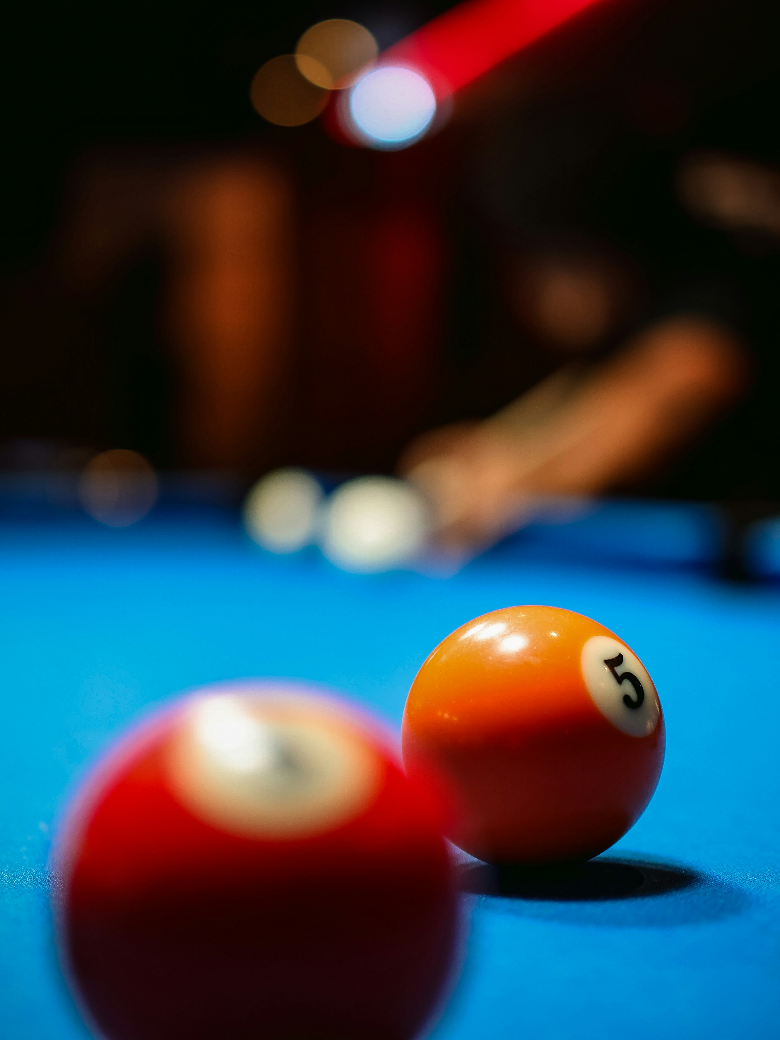 Five on a Blue Stage: A Macro Moment at the Pool Table