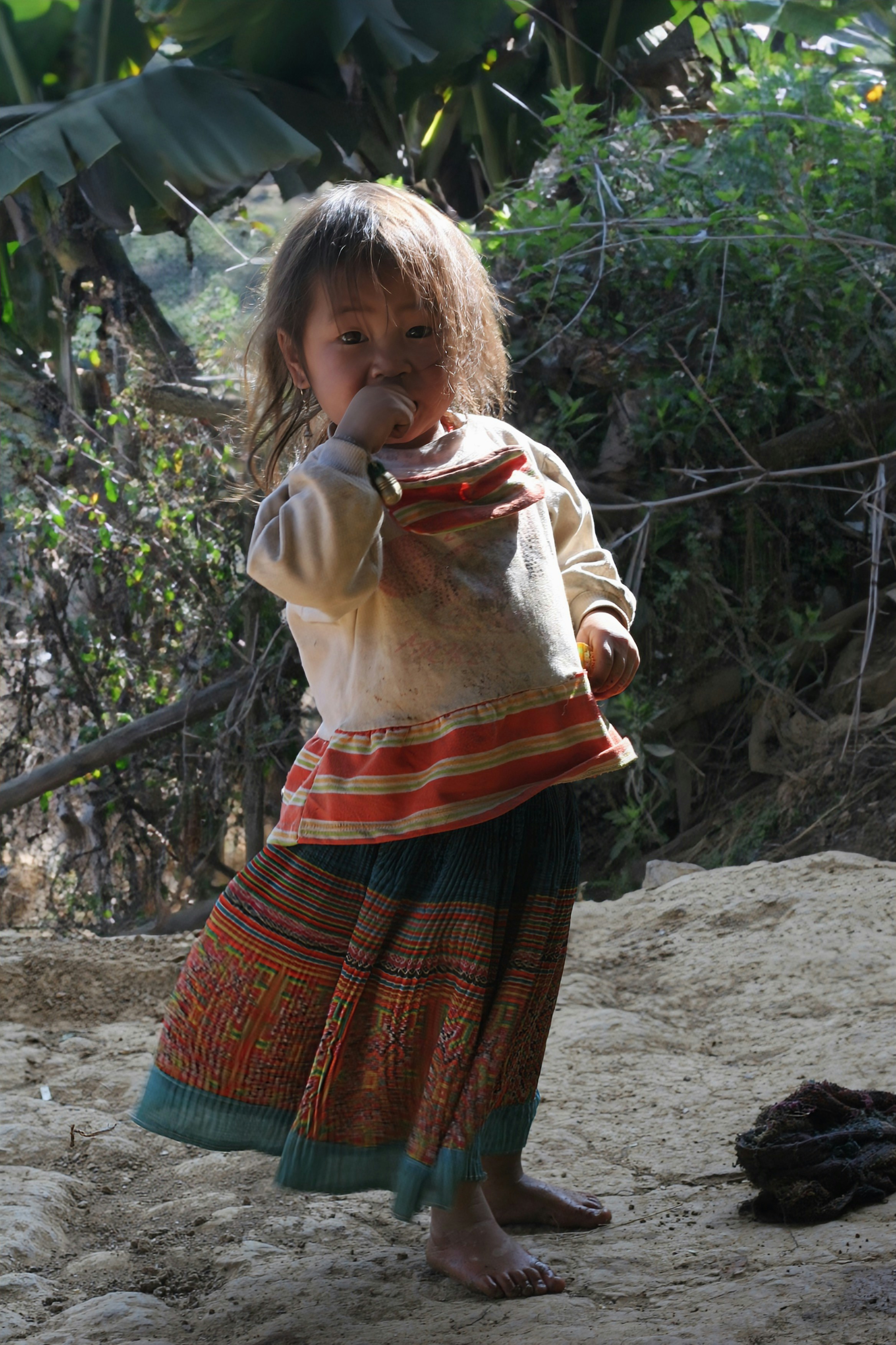 Whispers of Innocence in Traditional Attire