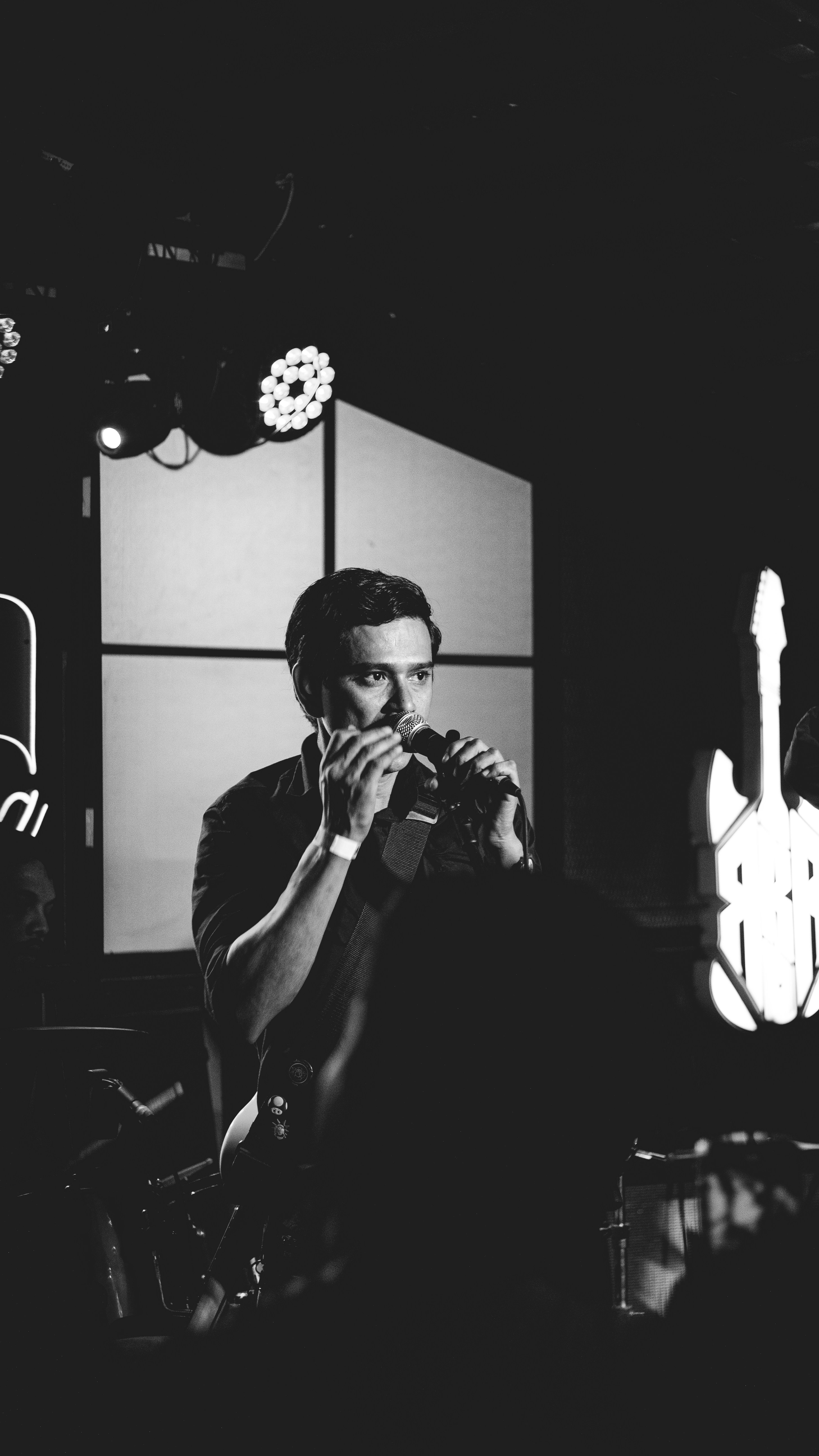 Noir Spotlight: The Vocalist's Quiet Command on a Dim Club Stage