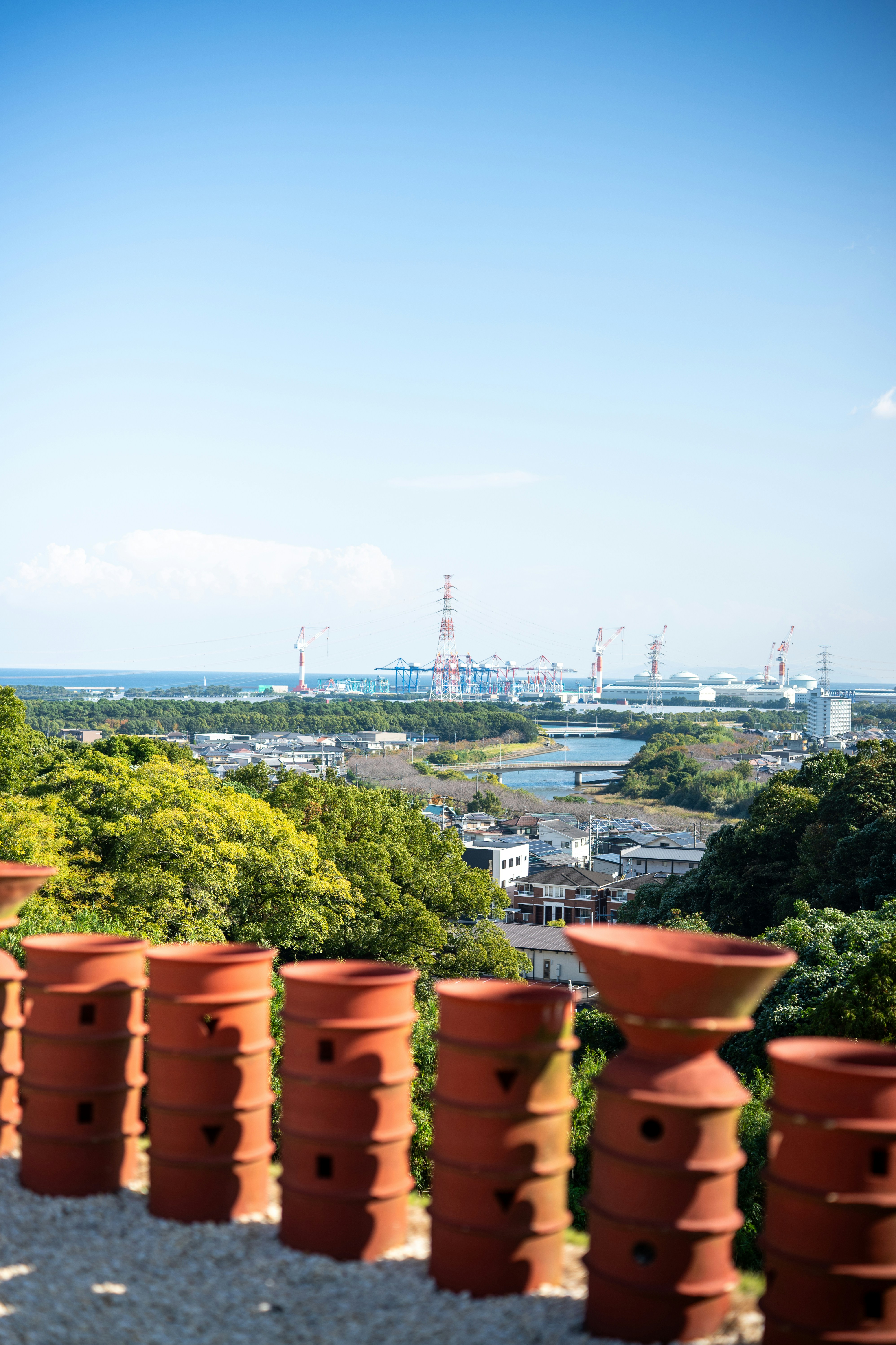 Terracotta Pillars Framing a Quiet Coastal Panorama