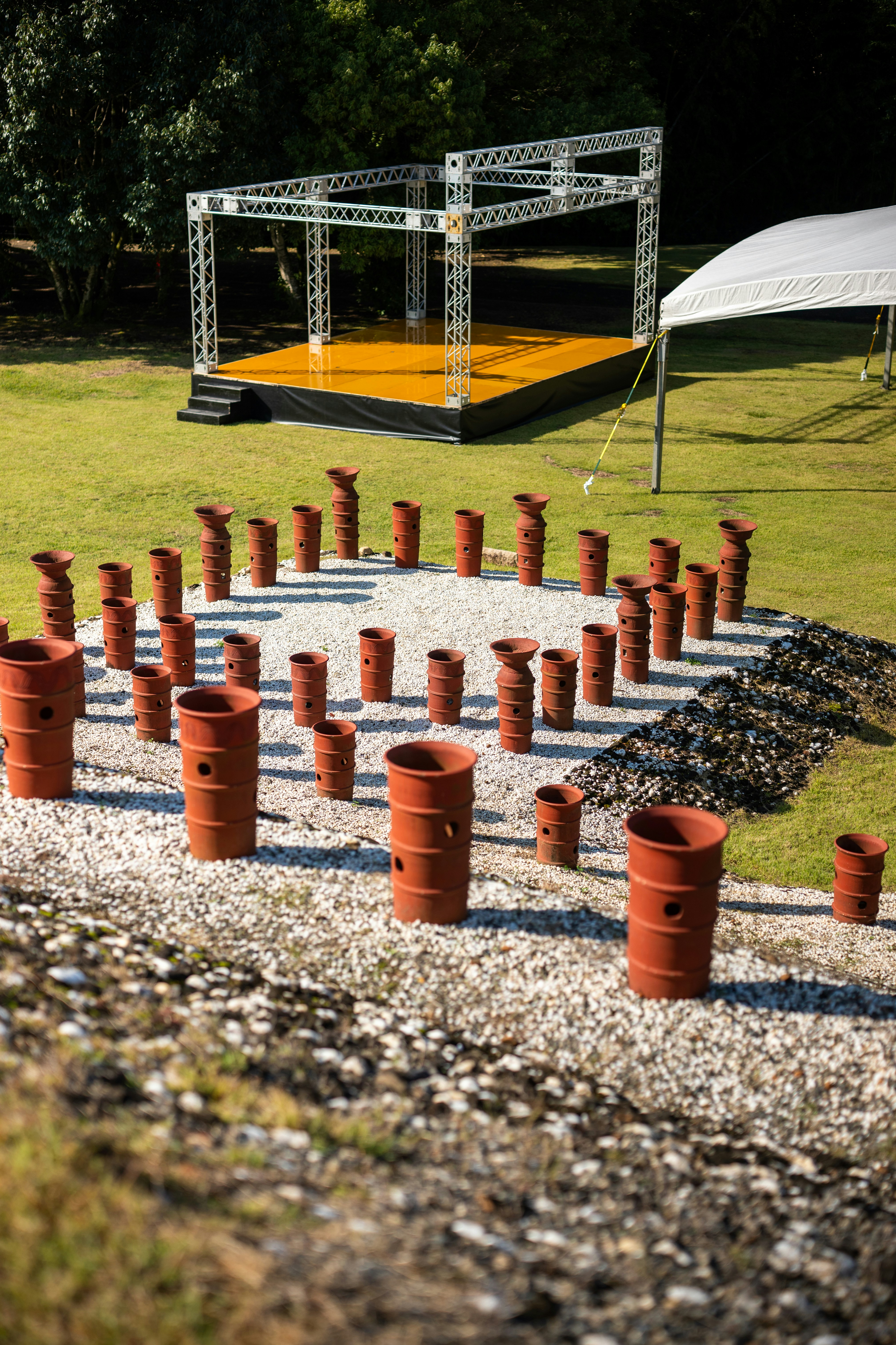 Ceramic Harmony: A Garden Installation of Terracotta Forms
