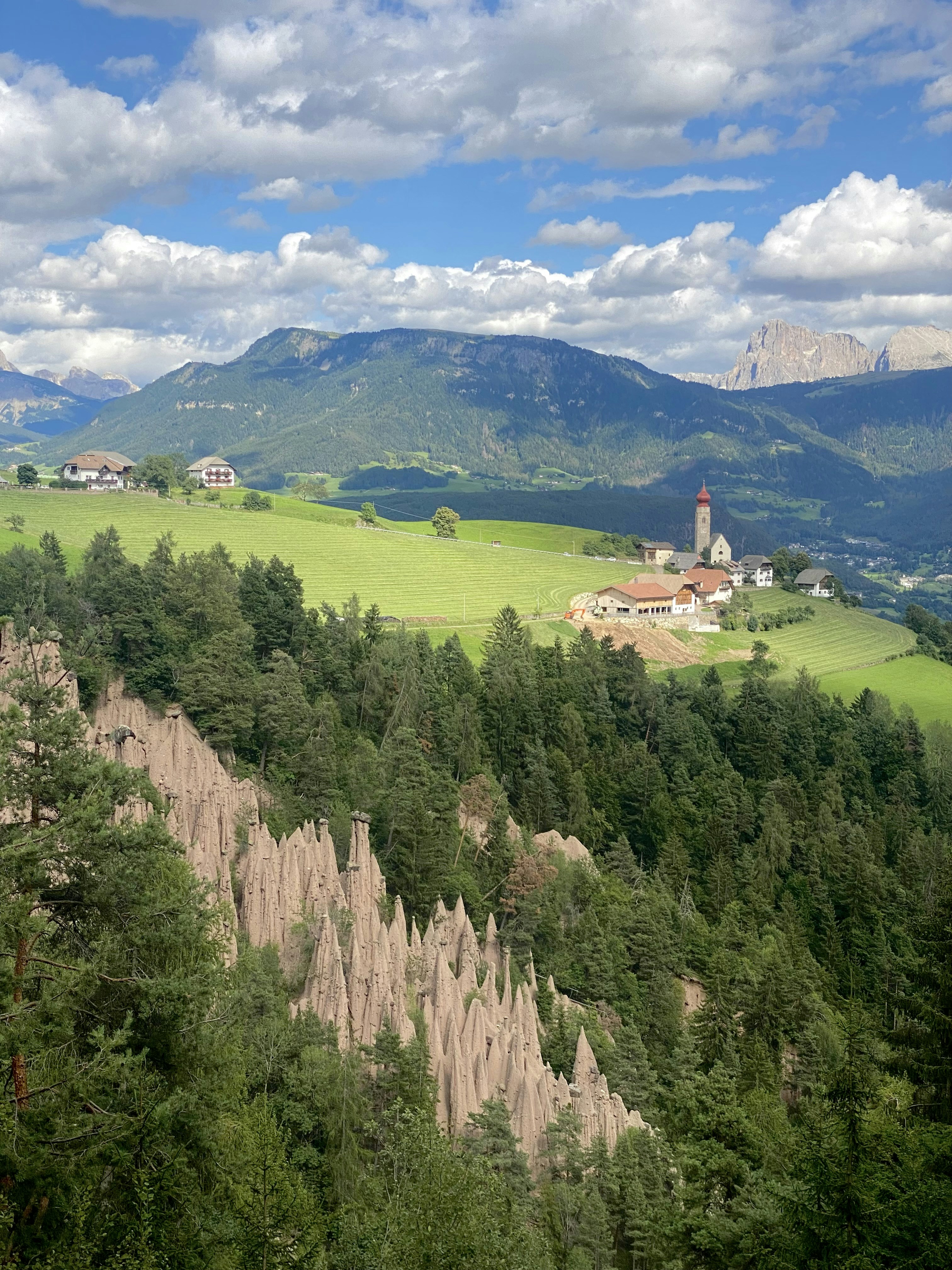 Nature's Sculpted Pinnacles Amidst Serene Valleys
