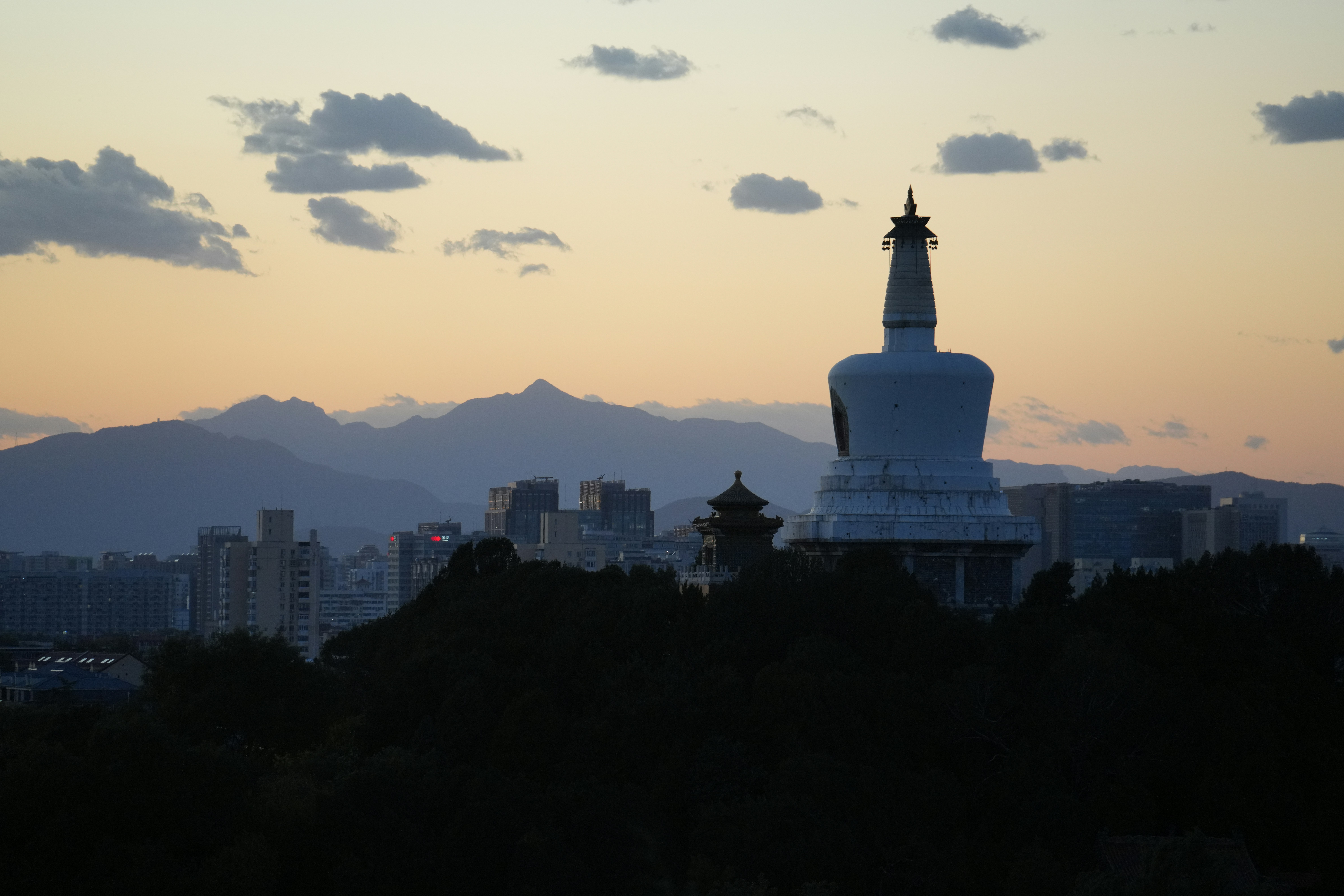 Twilight Stupa: Silhouette Over the City Ridge