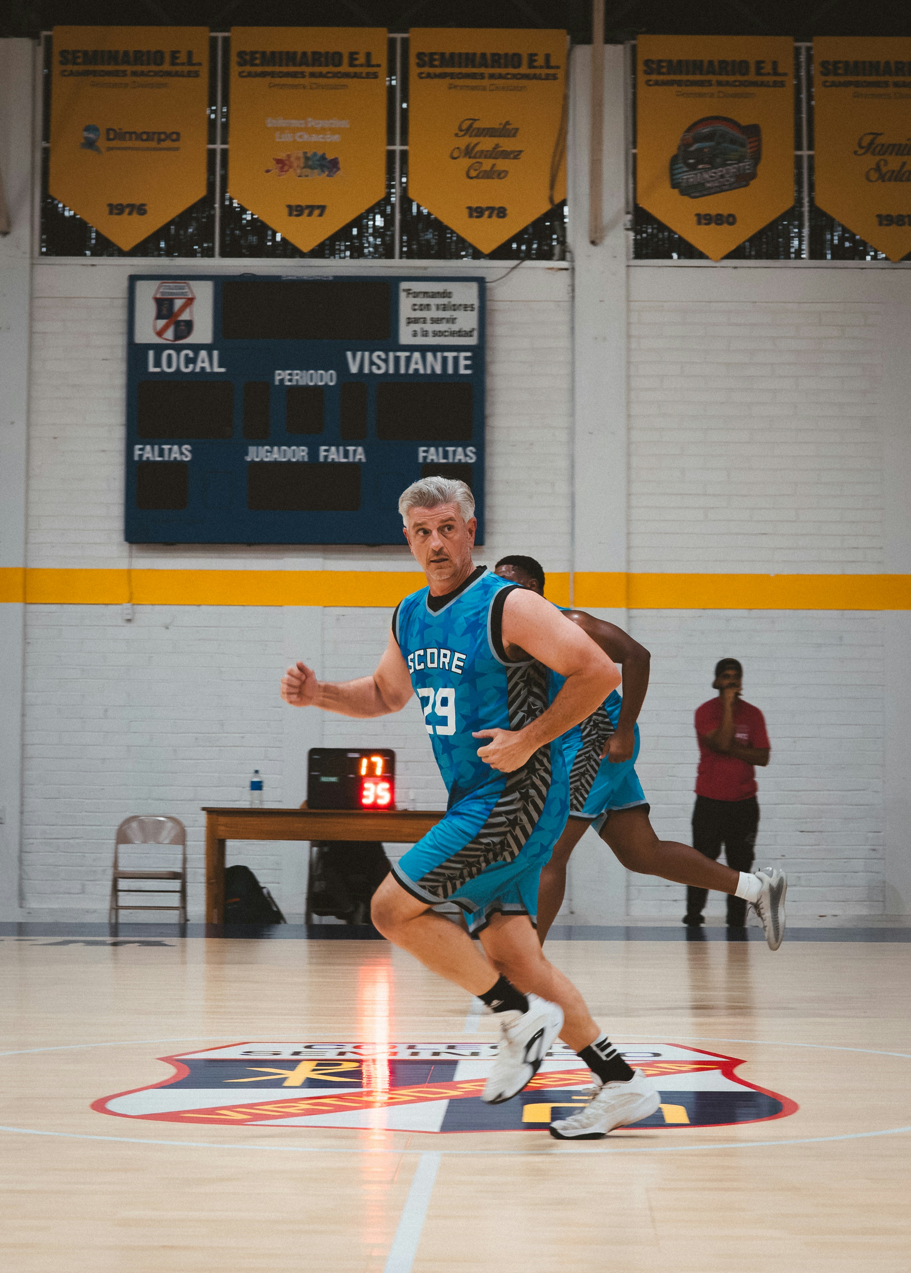 Breakaway in Blue: Sprint Across a Local Gym Court