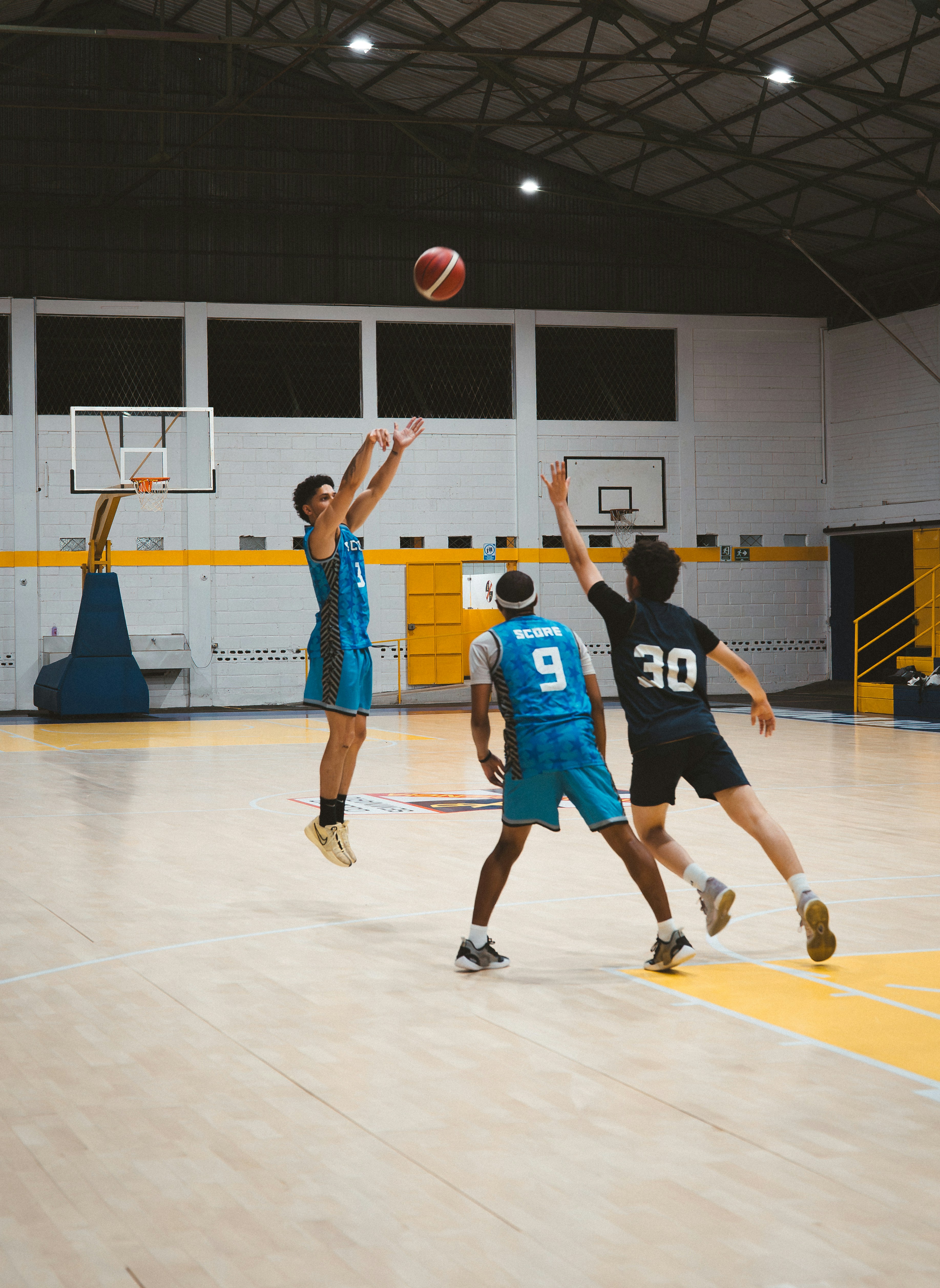 Shooting photos and shooting hoops on the first night of our Costa Rica missionary trip