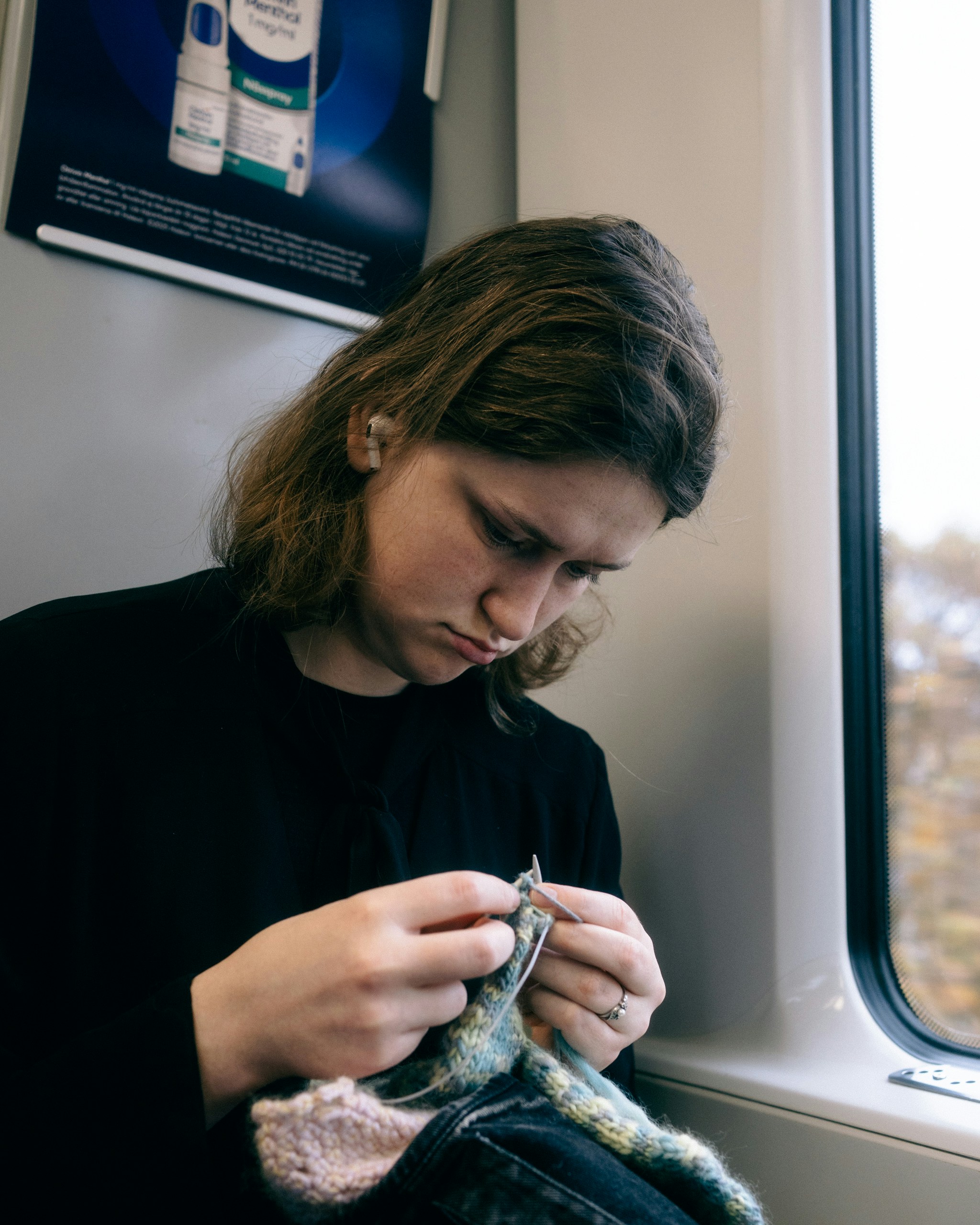 A Quiet Moment on the Train: Crafting Details in Wool