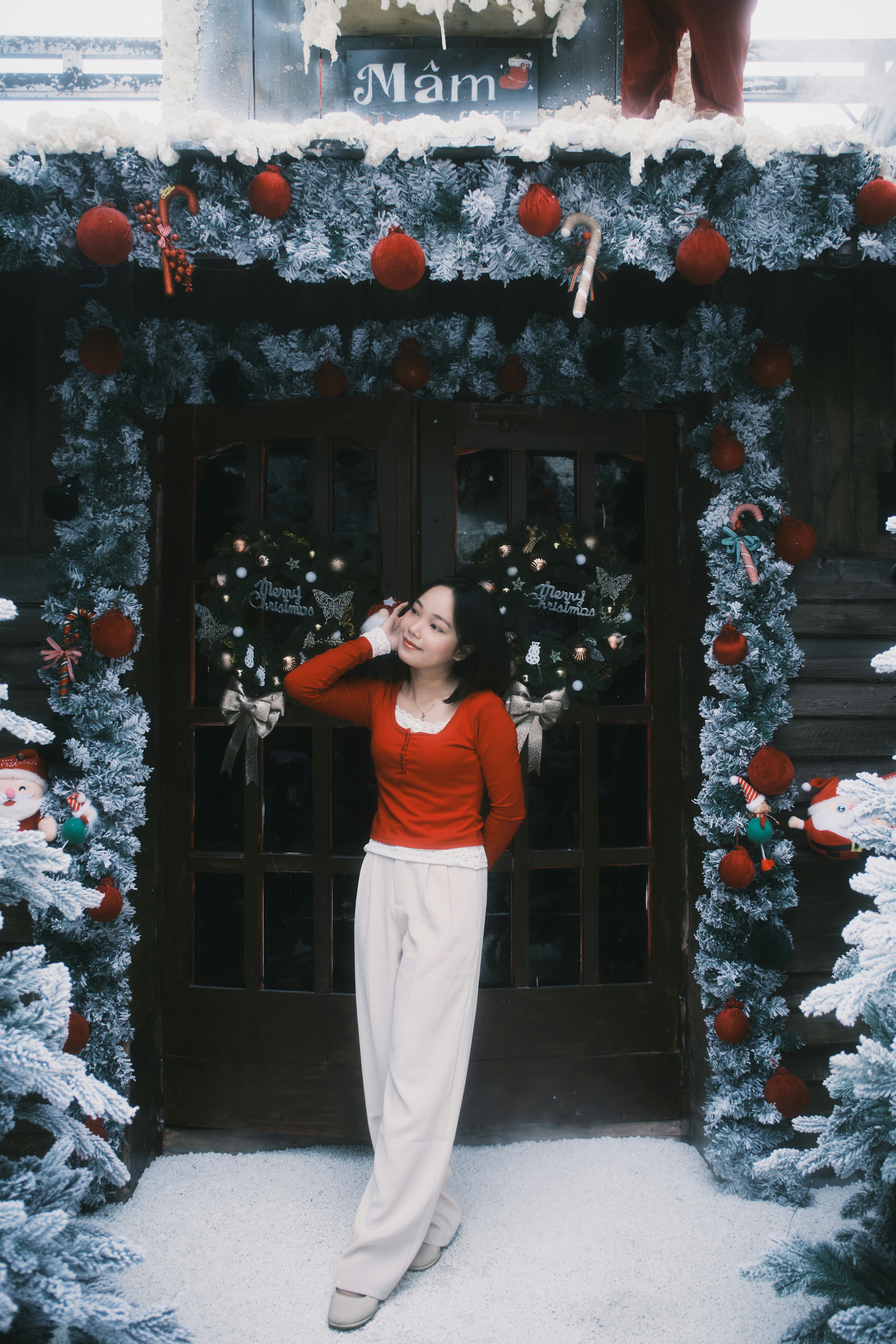 Crimson Warmth at a Snow-Dusted Christmas Portal