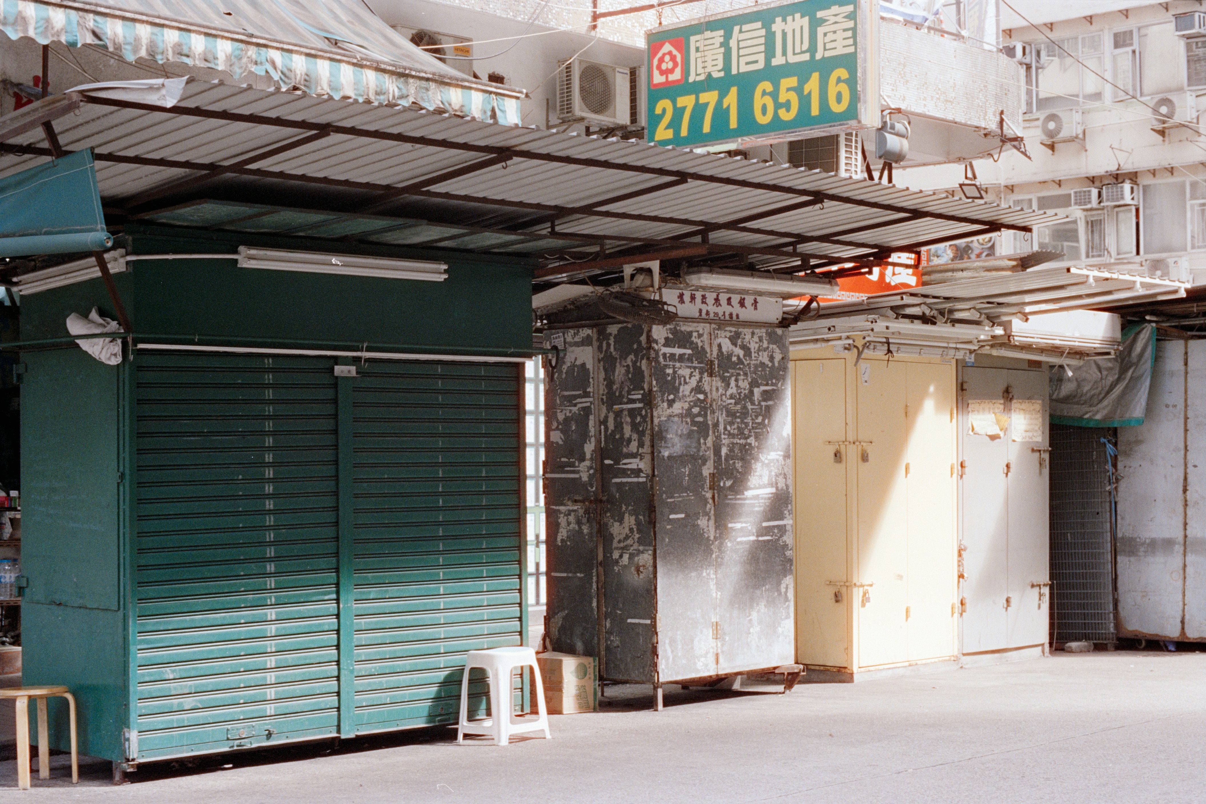 Row of closed market stalls under awnings photo – Free Business Image ...